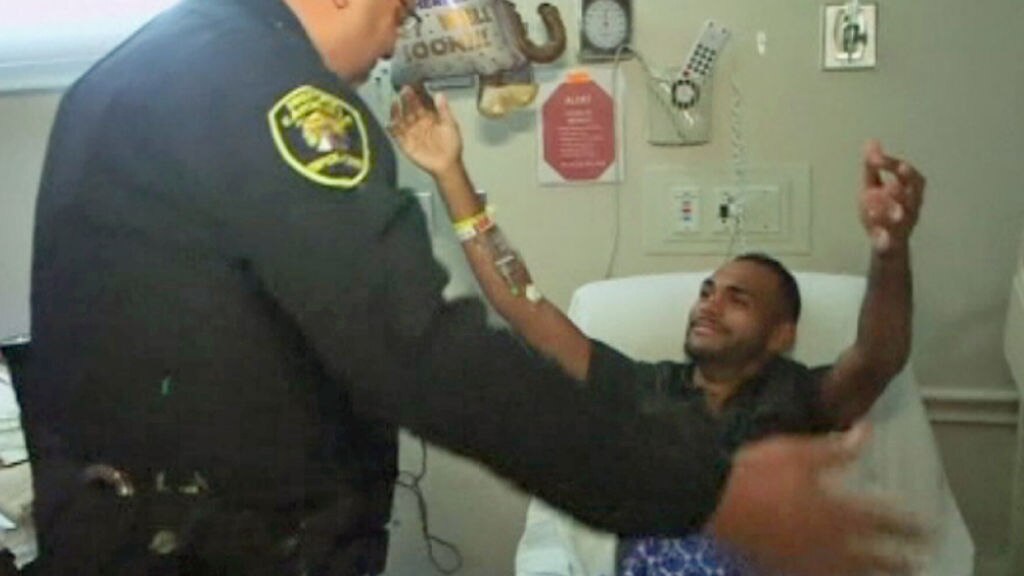 Orlando shooting survivor Angel Colon meets police officer who dragged ...