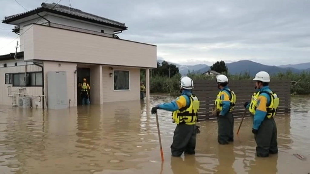 Flood waters recede in Japan leaving thick layer of mud - ABC News
