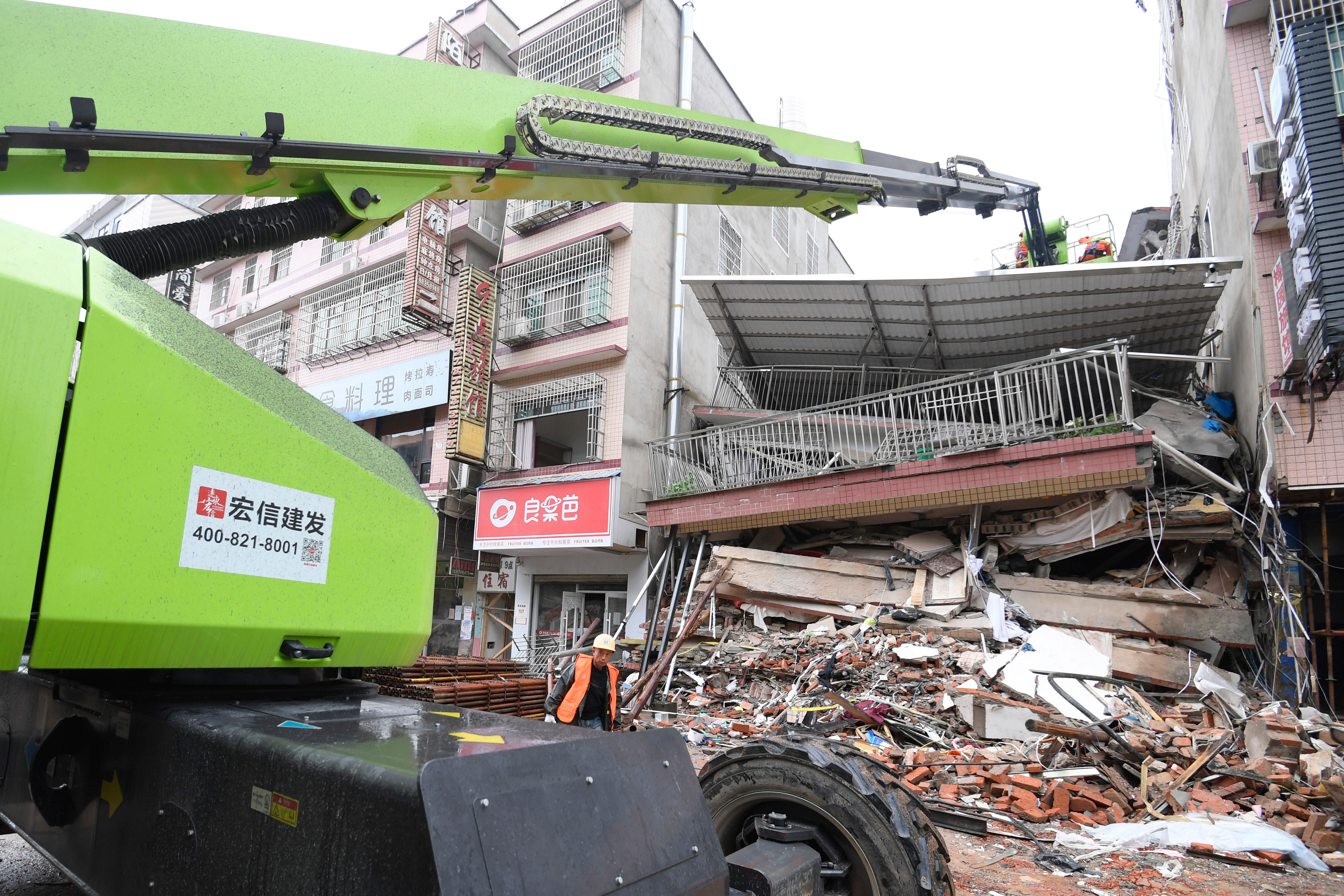 First deaths confirmed while dozens still missing following building ...