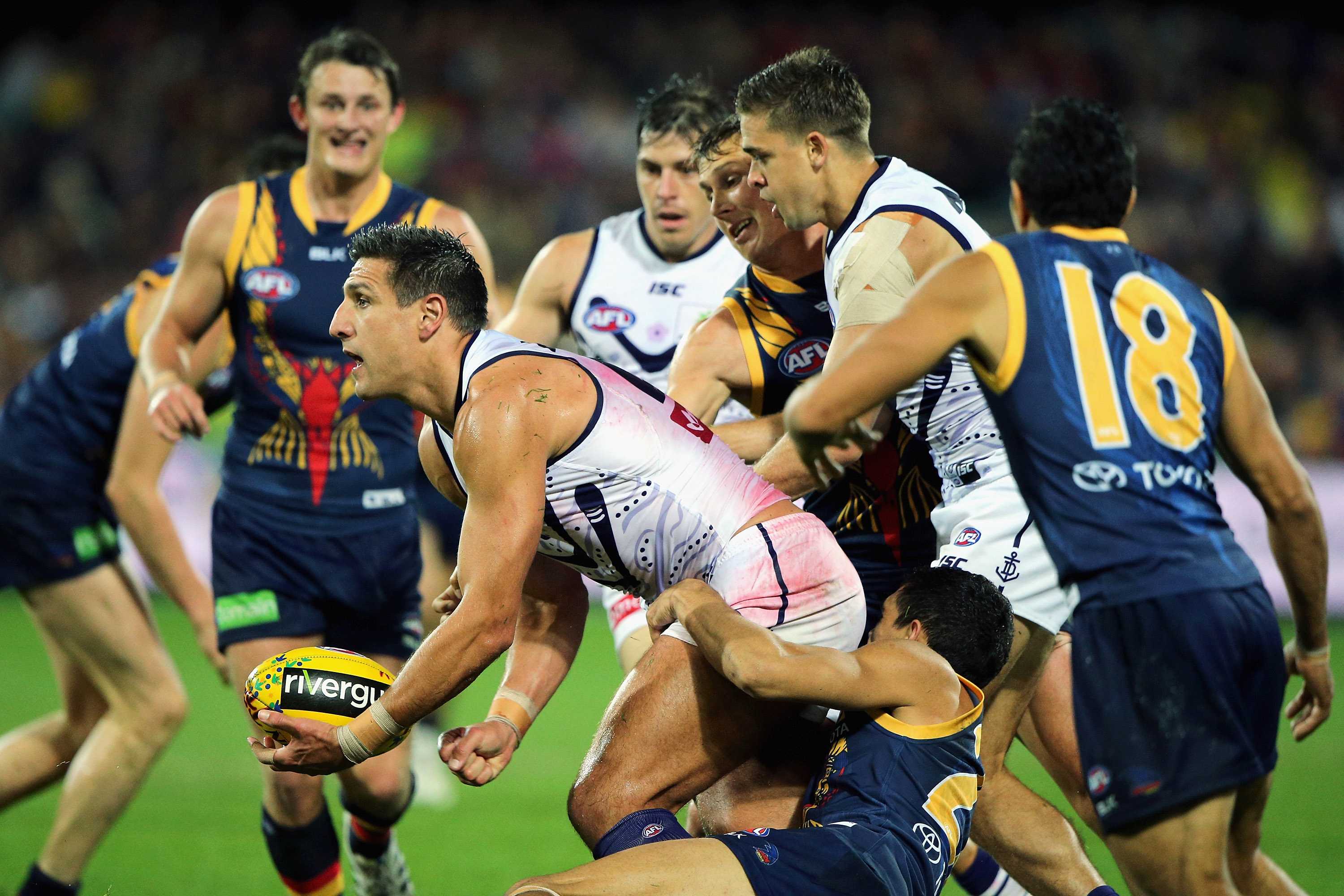 Fremantle Dockers beat Adelaide Crows by 11 points to stay undefeated ...