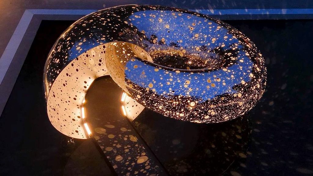 Ouroboros sculpture unveiled at national gallery - ABC News