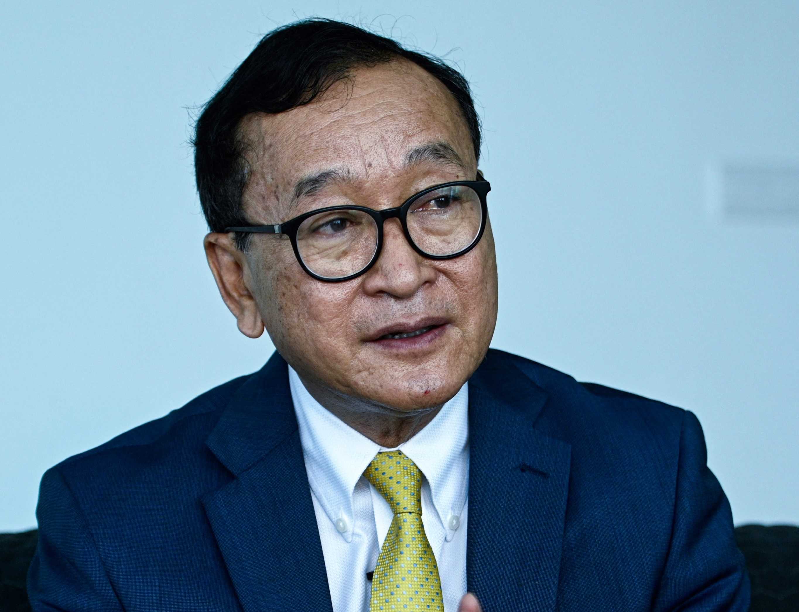 Cambodian opposition figure Sam Rainsy slapped with 25-year jail ...