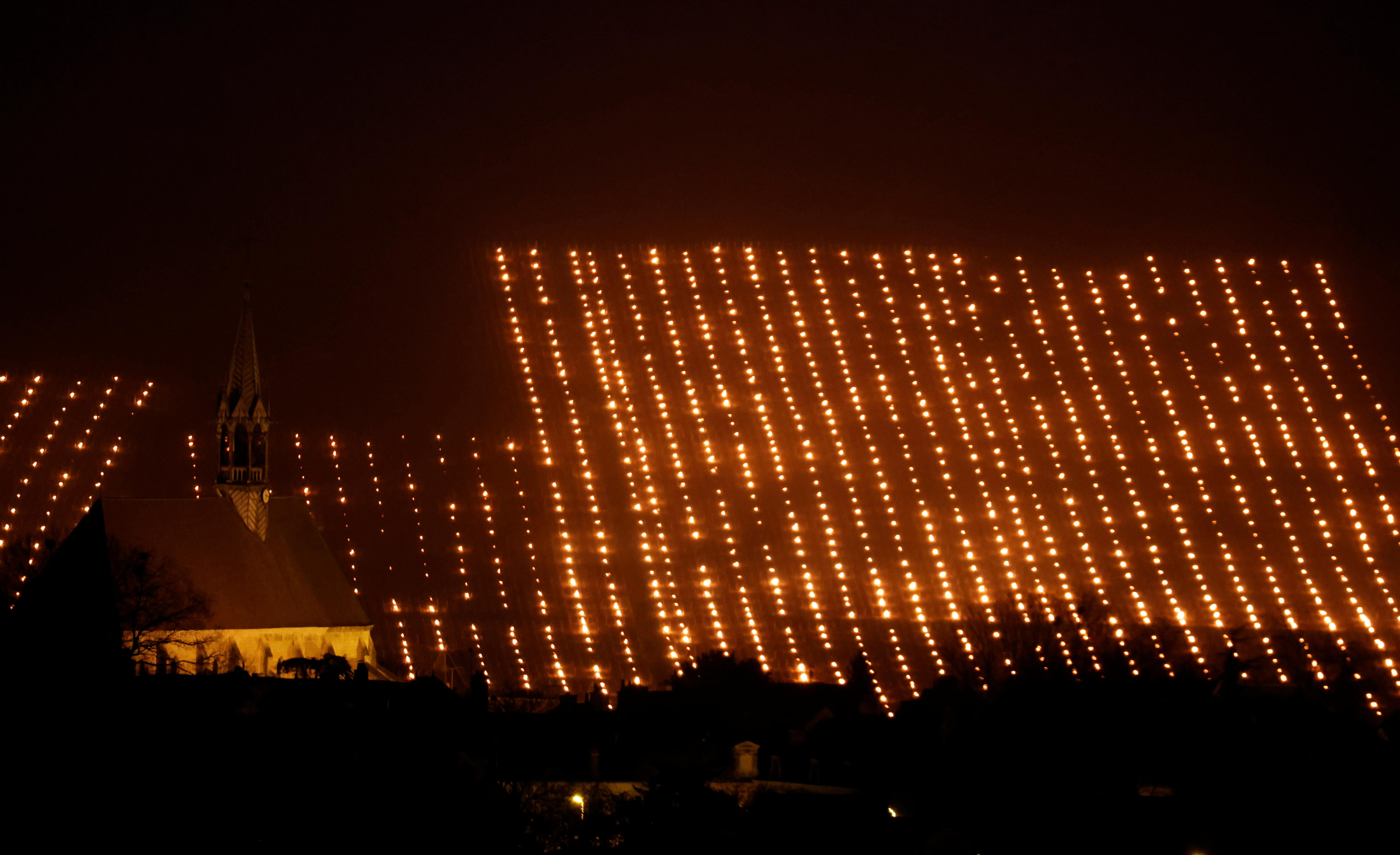 French winemakers light up fields to save the 2021 harvest from early ...