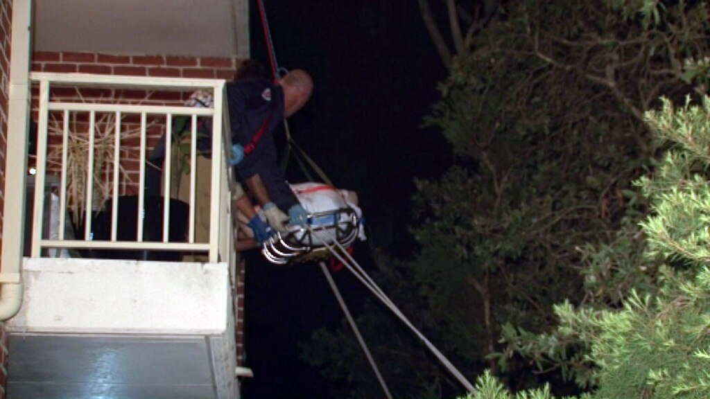 Collapsed 180kg man winched from Sydney balcony - ABC News