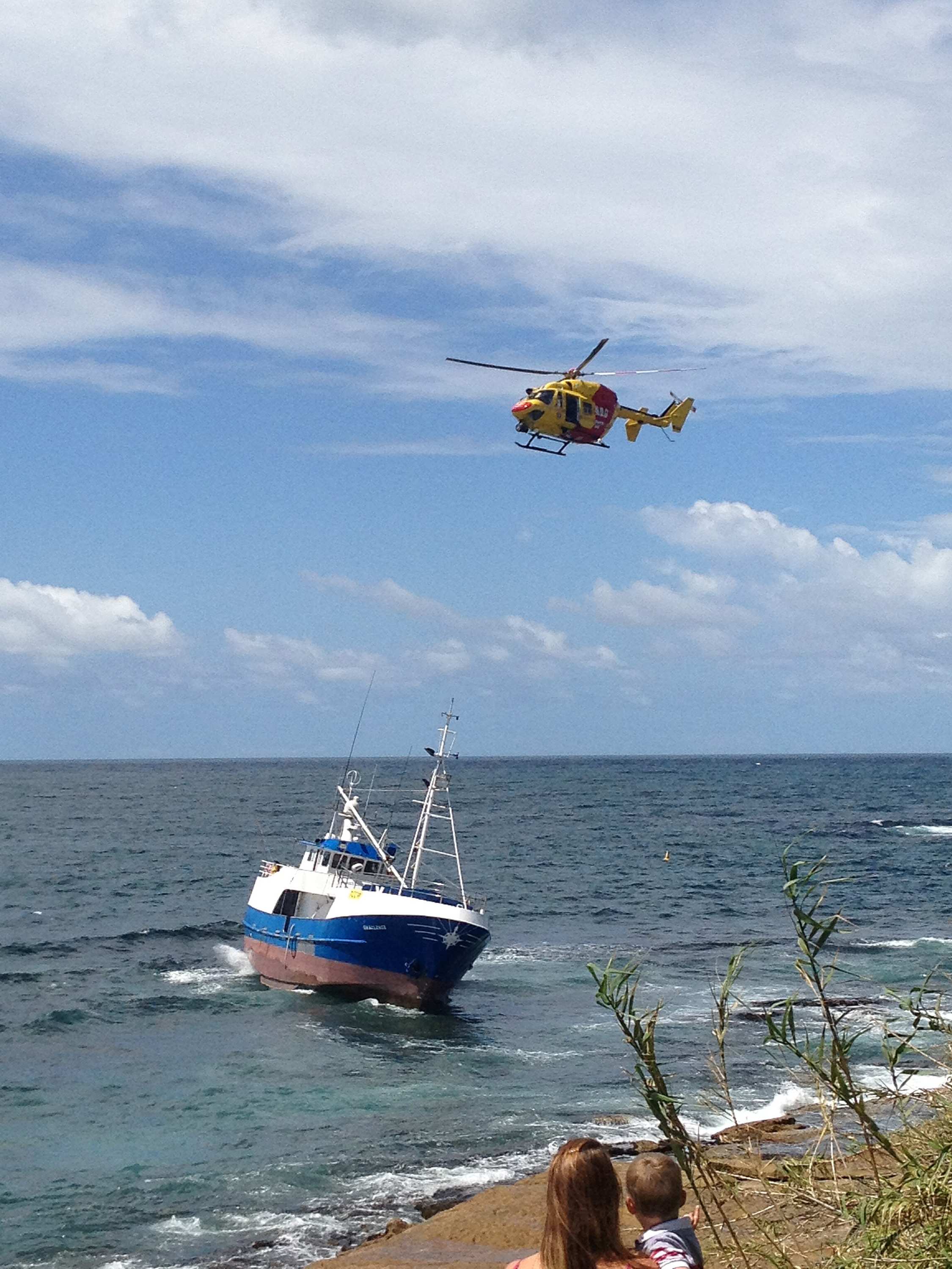Stranded fishing trawler saved from rocks - ABC News