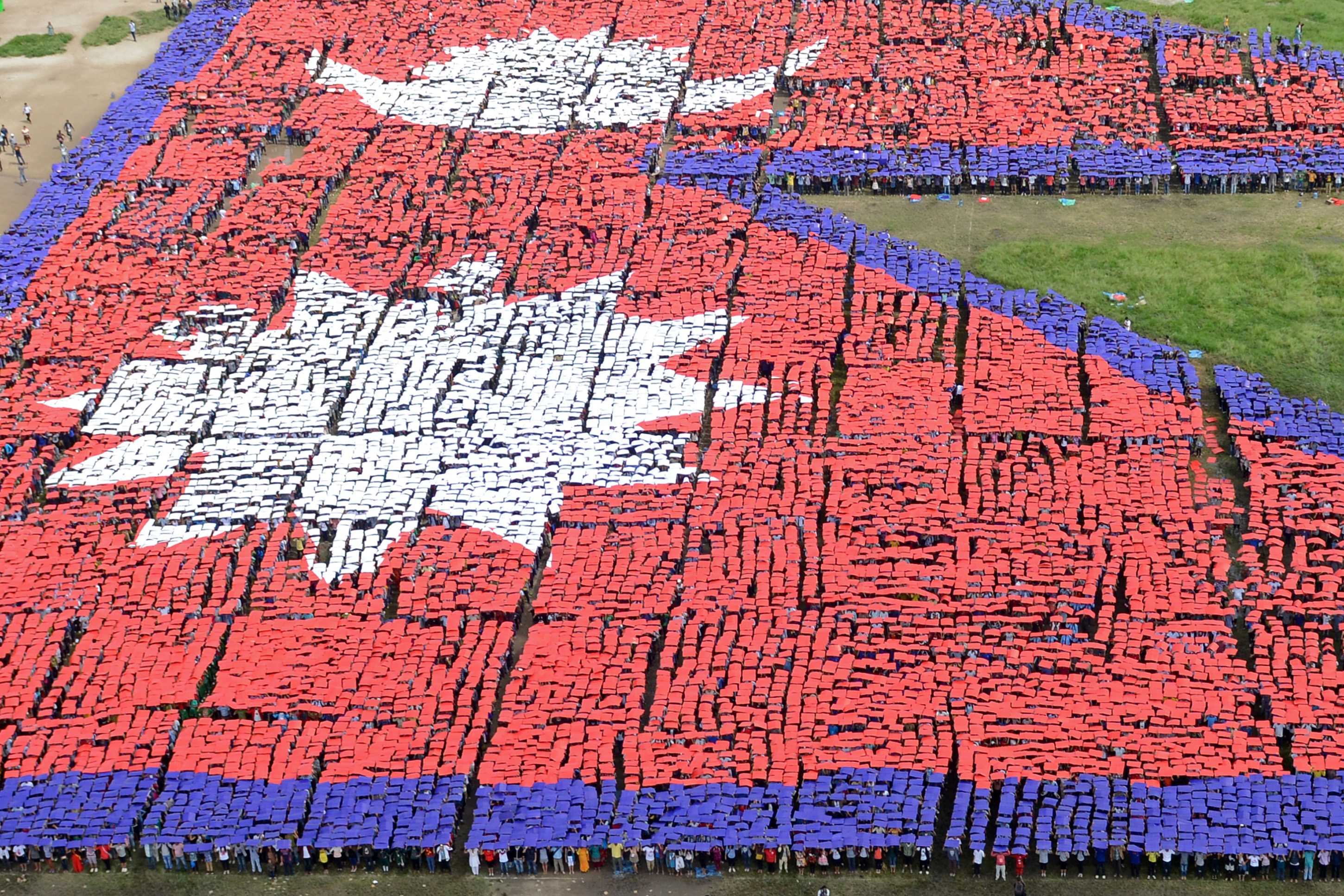 Thousands of Nepalese gather in Kathmandu to form the world's largest ...