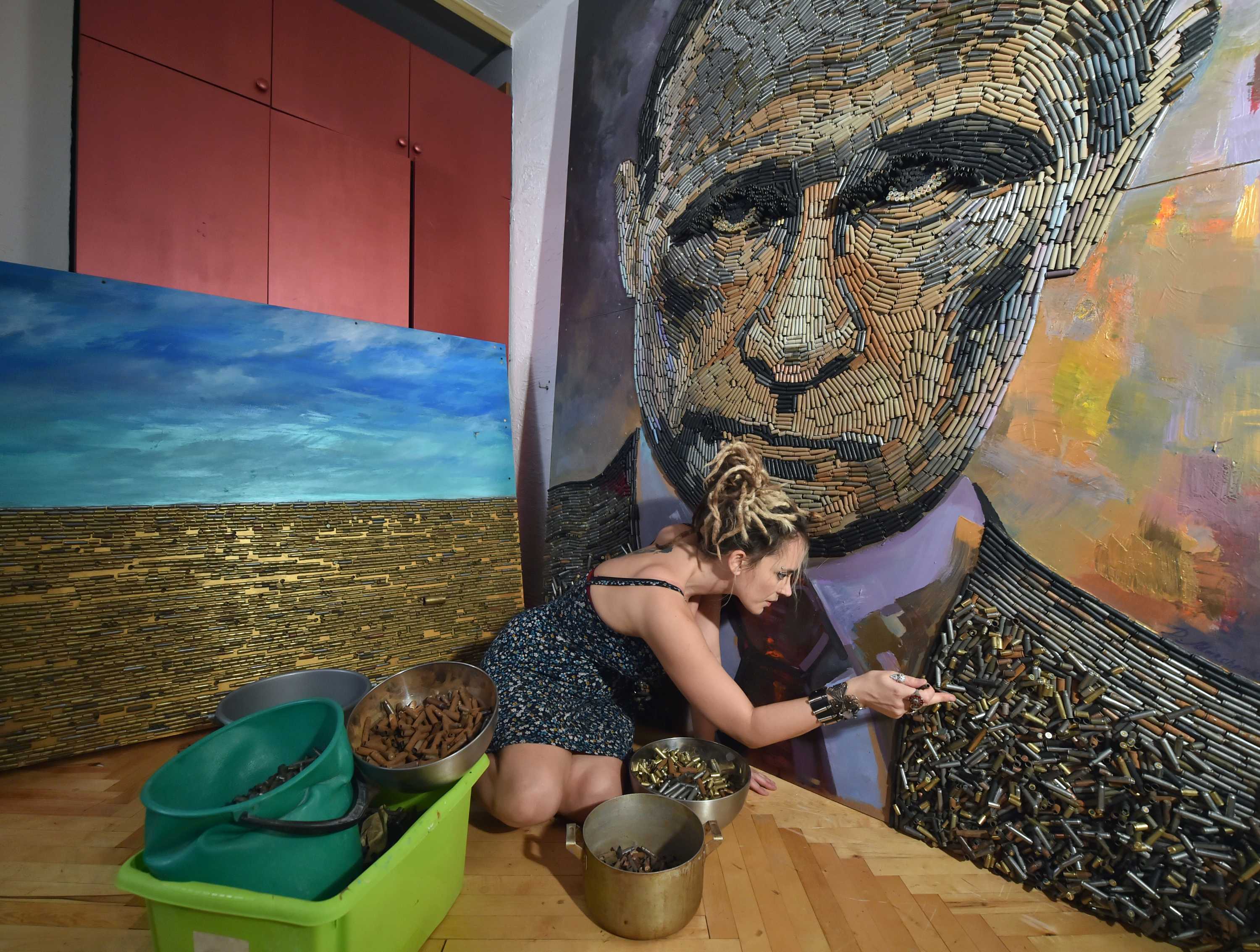 The Face of War: Ukraine artist Daria Marchenko creates Vladimir Putin ...