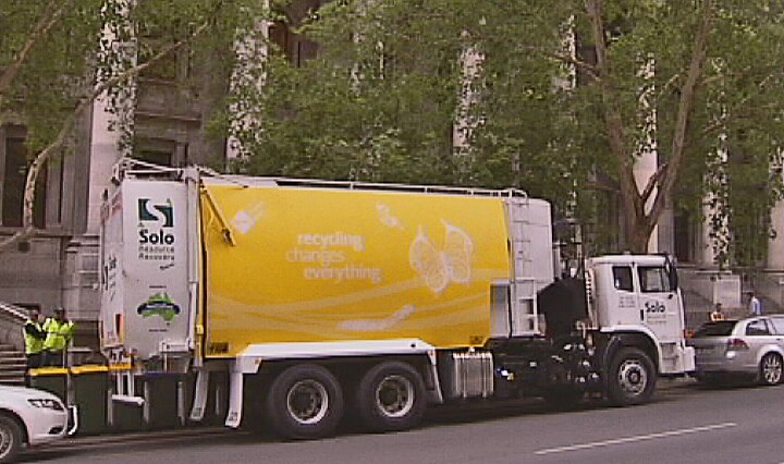 Garbage truck parked outside Parliament House in Adelaide highlights ...