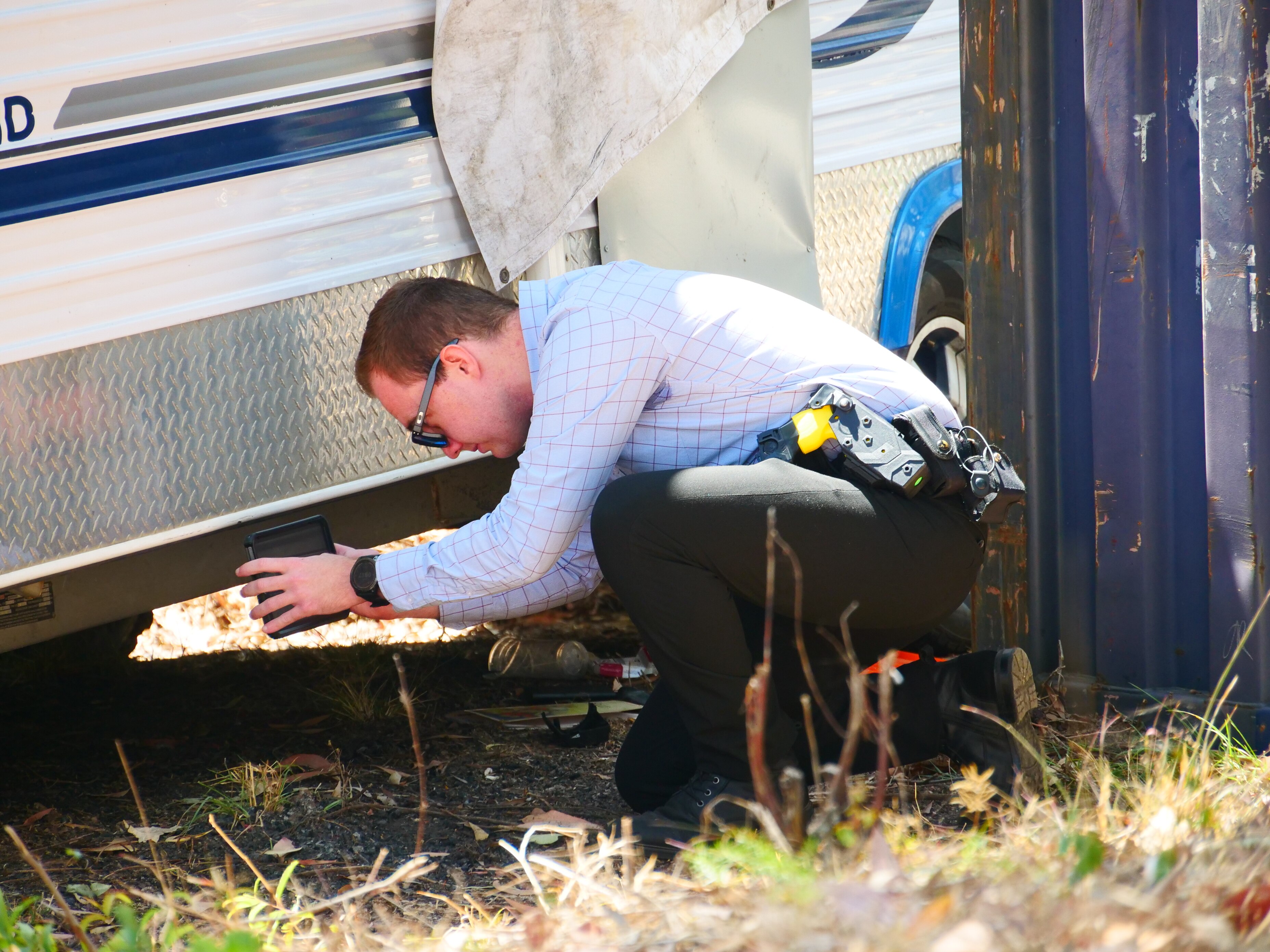 Man charged after running over dog, crashing caravan with children ...