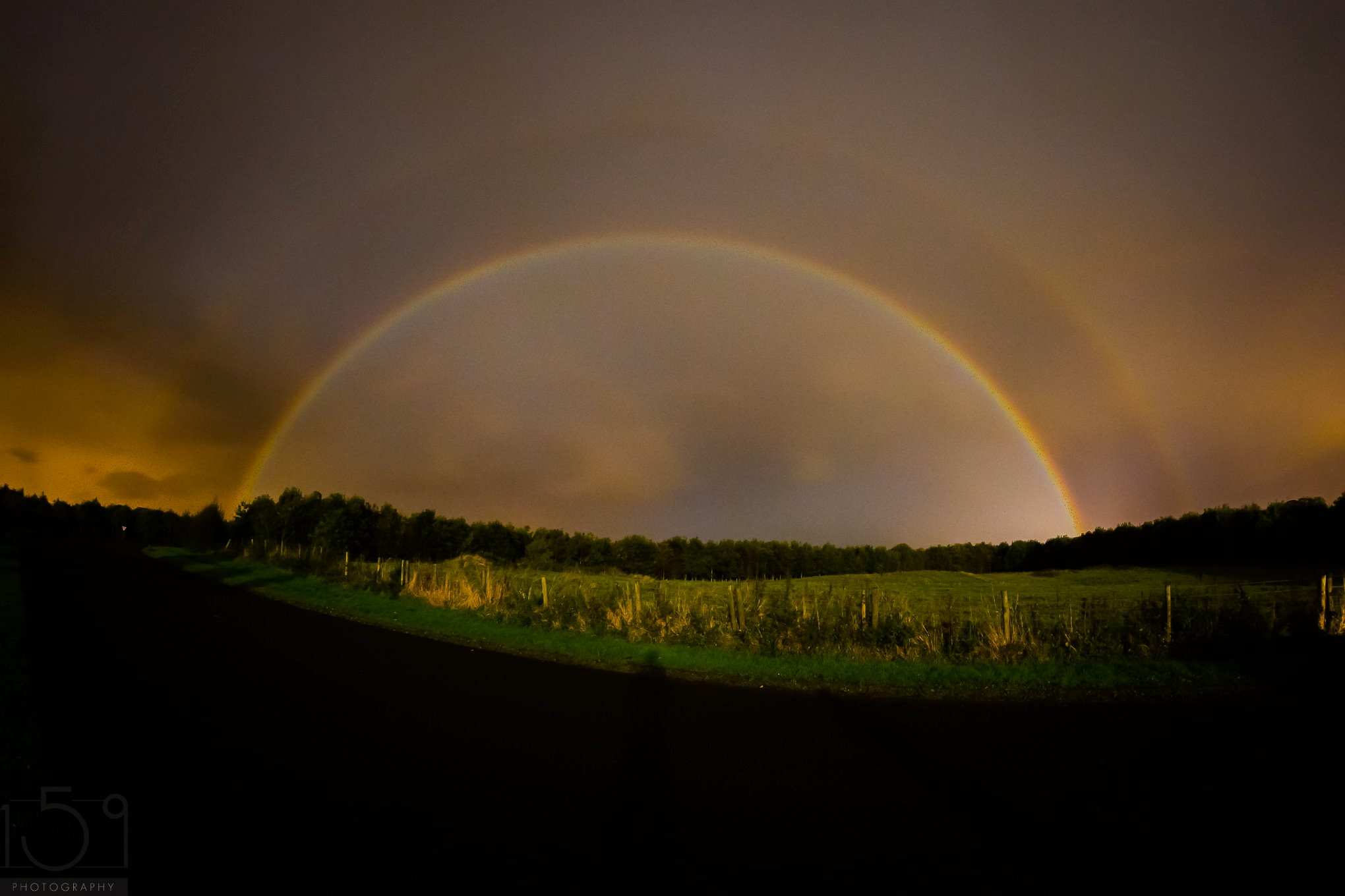 Rare double lunar rainbow or moonbow captured by UK photographer - ABC News