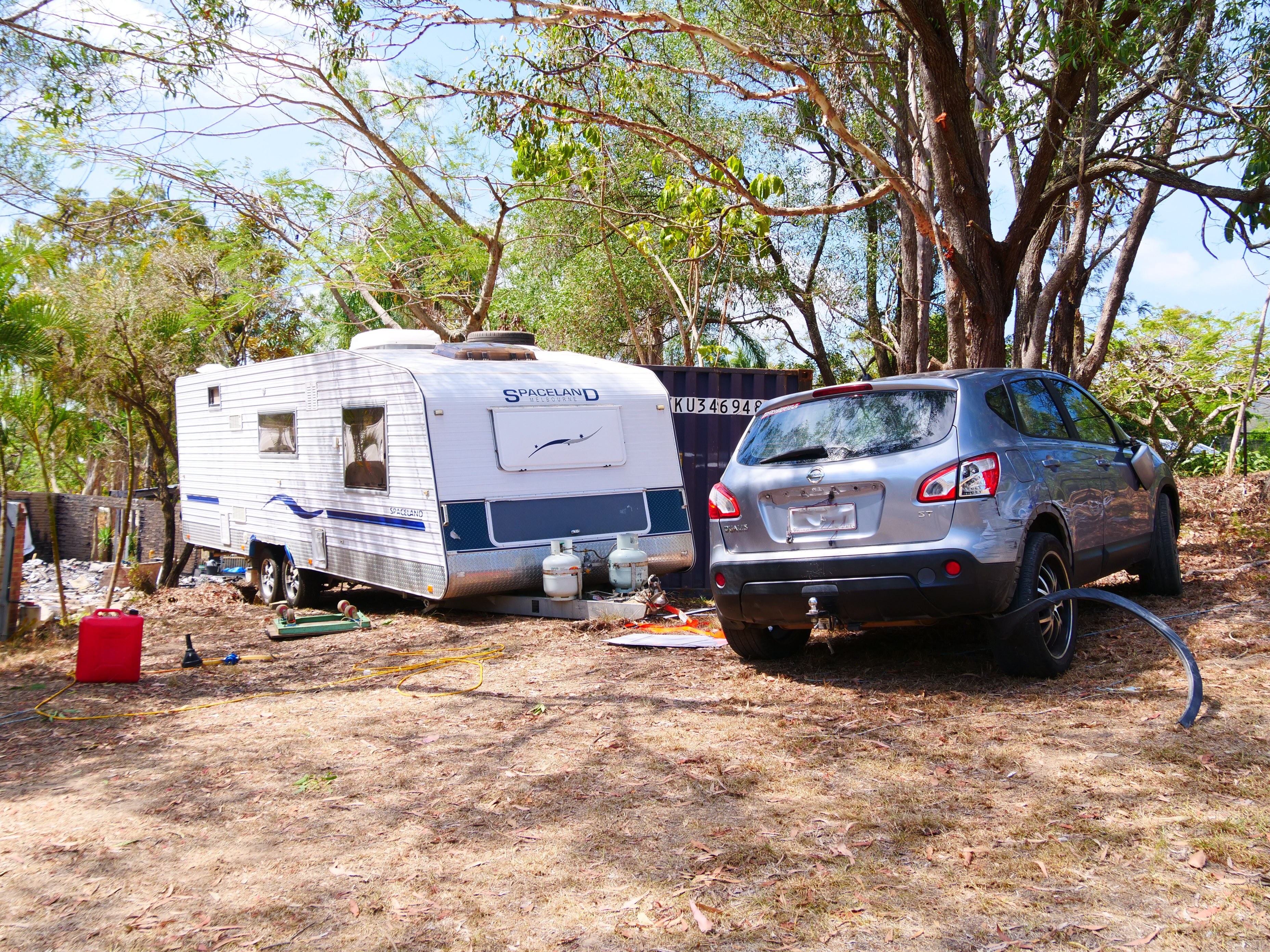 Man charged after running over dog, crashing caravan with children ...