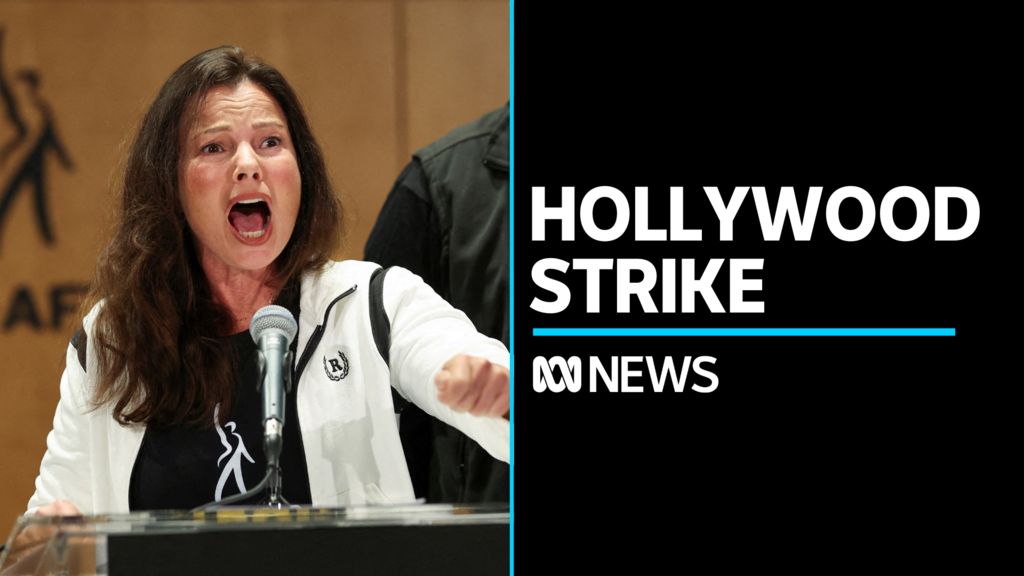 Clothing importer Emmanuel Ajaab opens a bale of clothing from ...