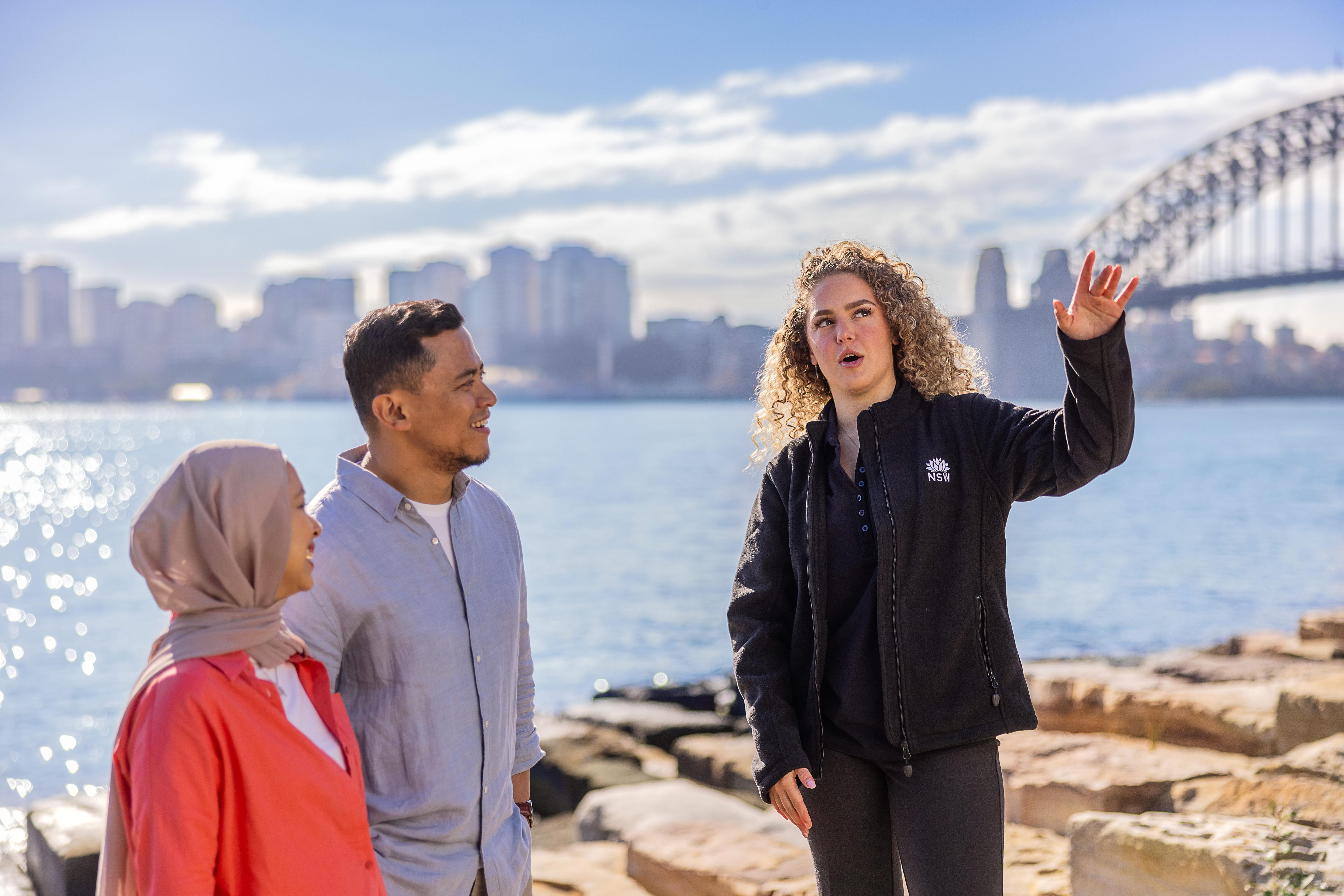 International workers show visitors around Australia as tour guide ...