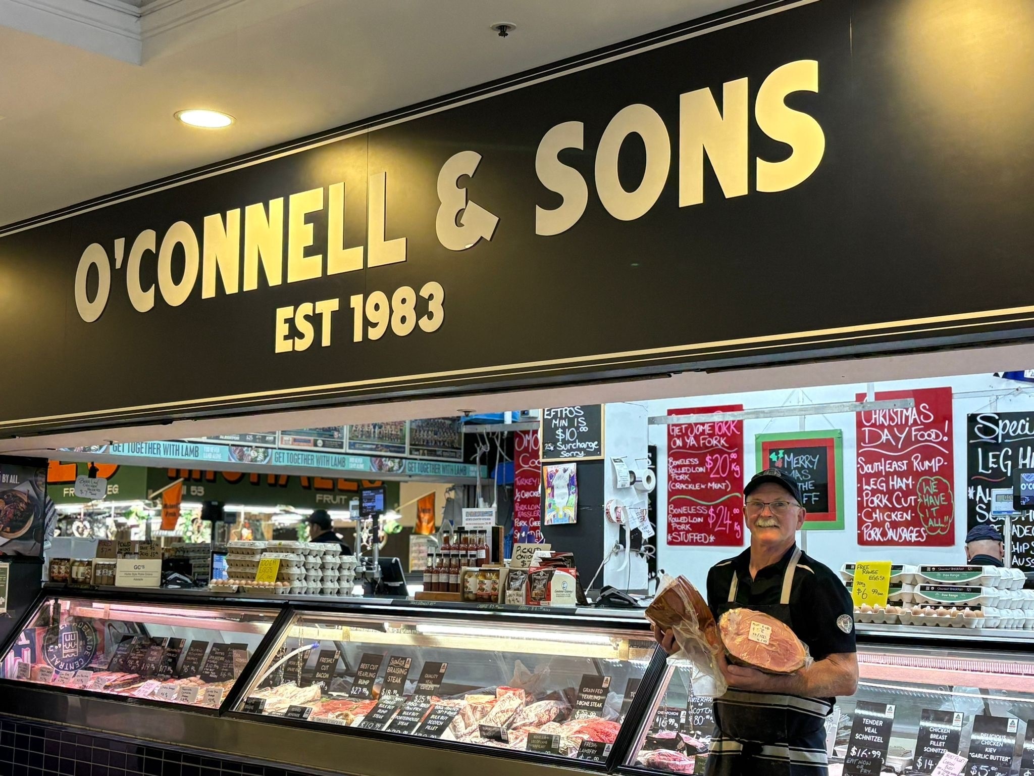 Thousands of hams sell for Christmas as Central Market extends shopping ...