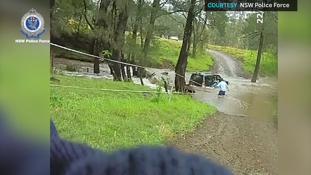 NSW Police rescue passengers trapped in floodwaters - ABC News