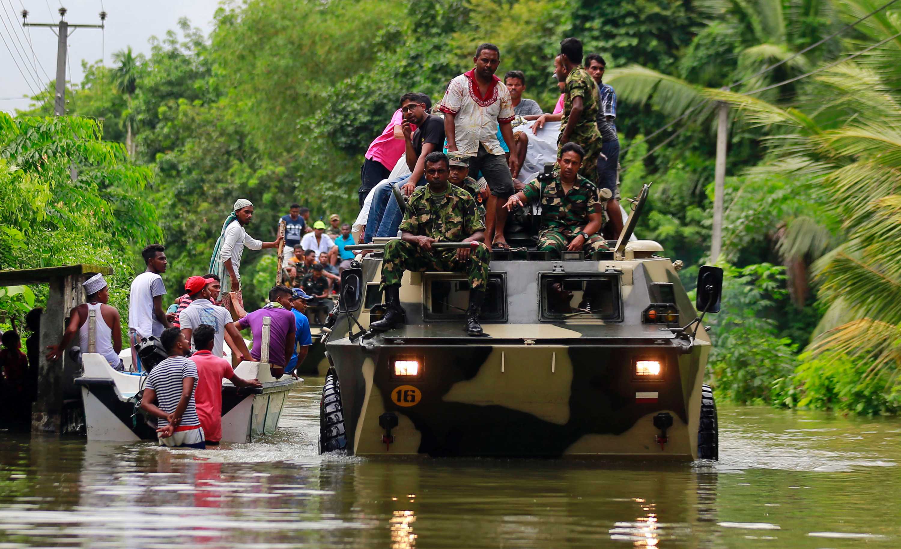 Sri Lankan landslides, flooding kills 122, as nation appeals for ...
