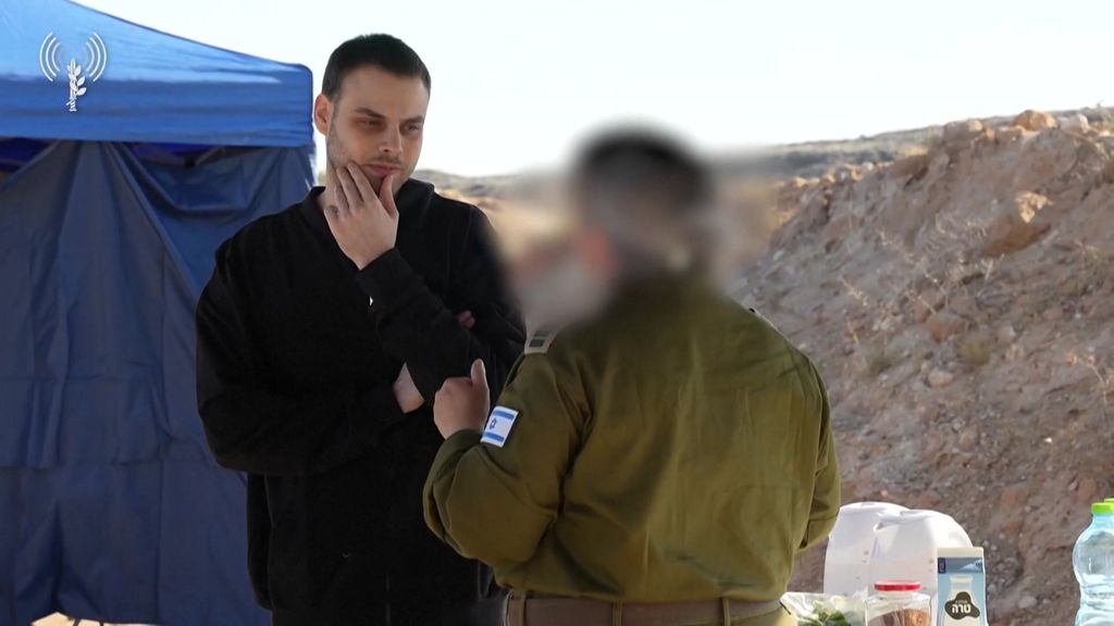 Former hostage Alon Ohel is received by the IDF representatives - ABC News