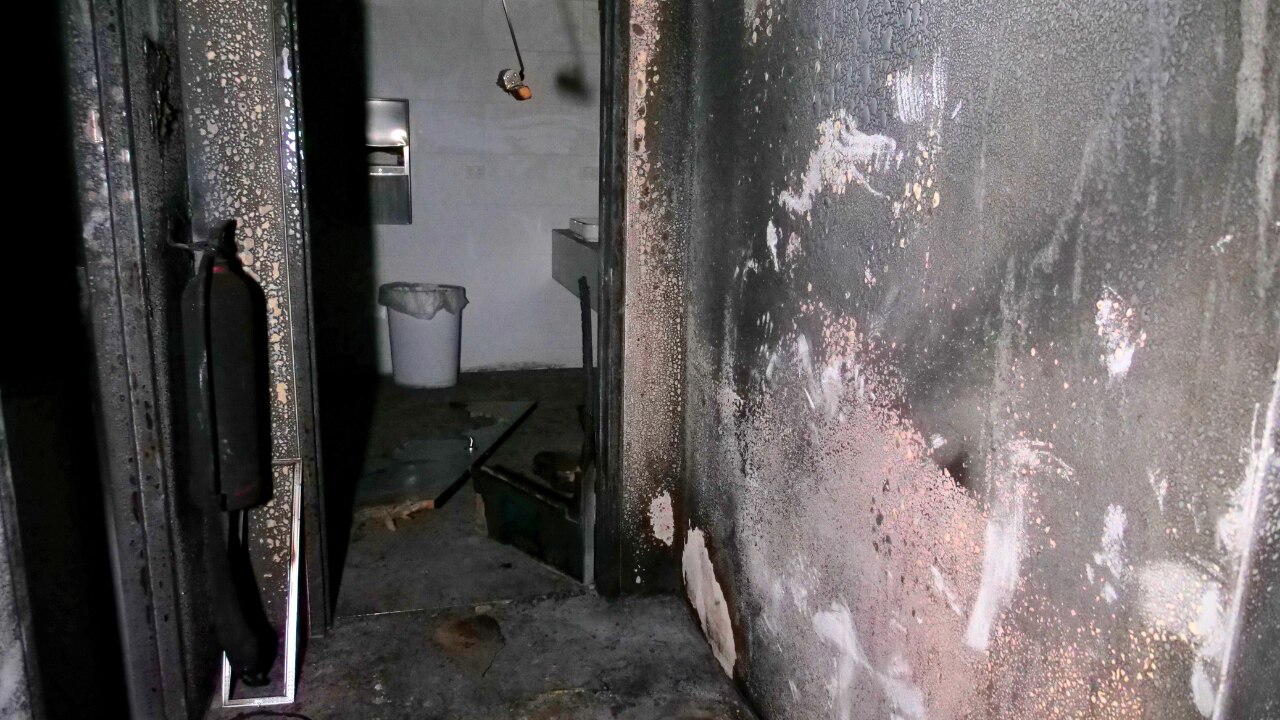 Photos show damage caused in alleged arson attack on Gosford law firm ...