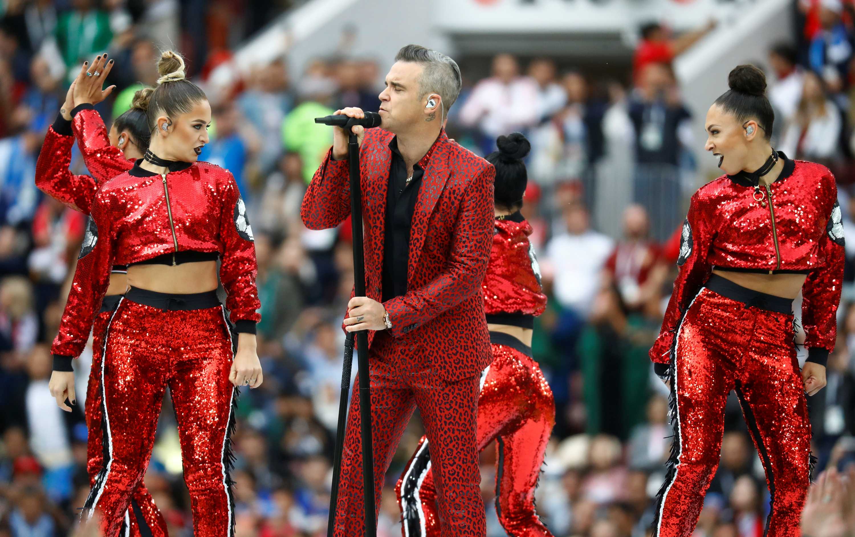 World Cup opening ceremony: Robbie Williams' middle finger, Vladimir ...