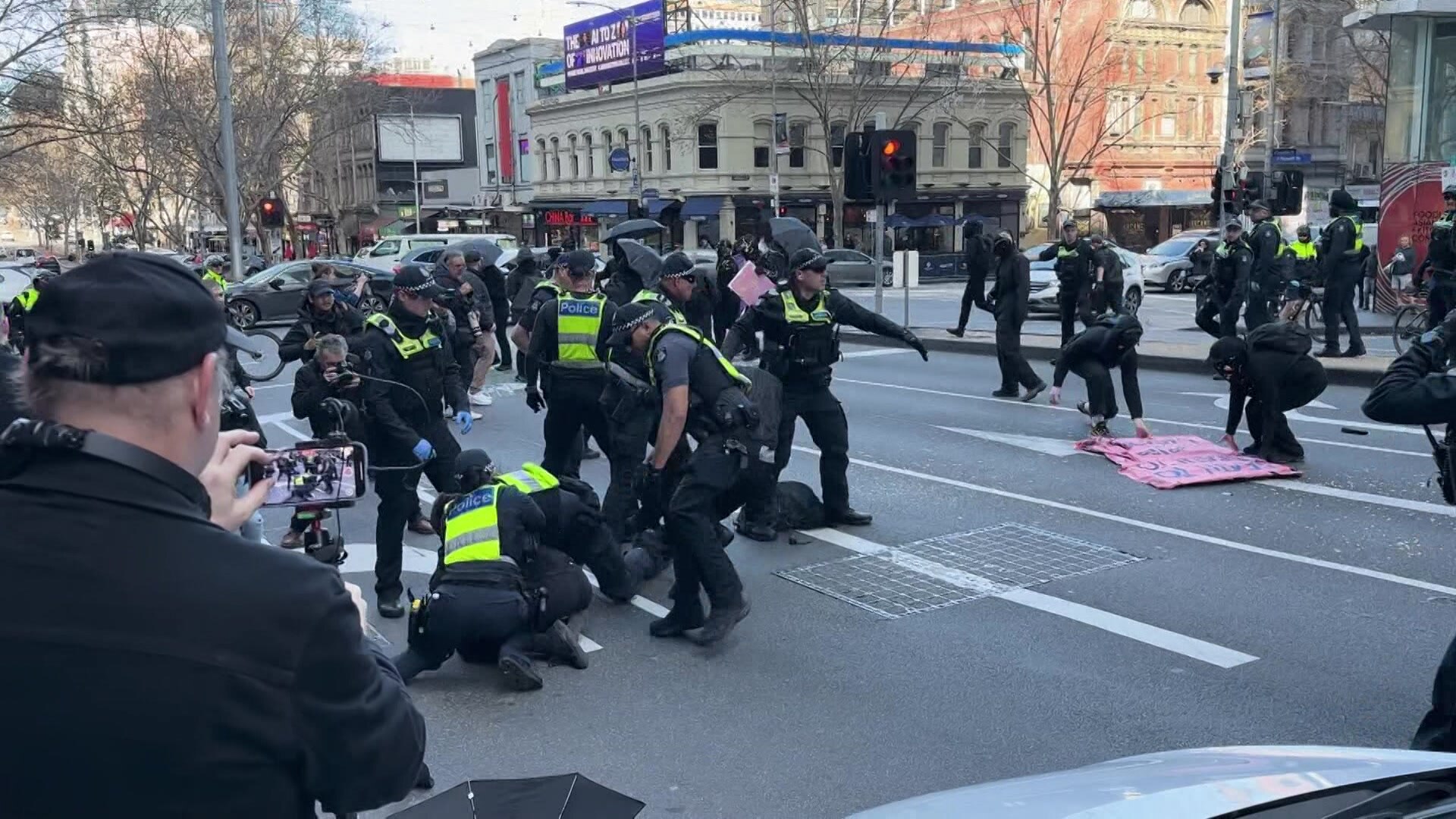 Clashes with police in Melbourne's CBD as Women Will Speak rally held ...