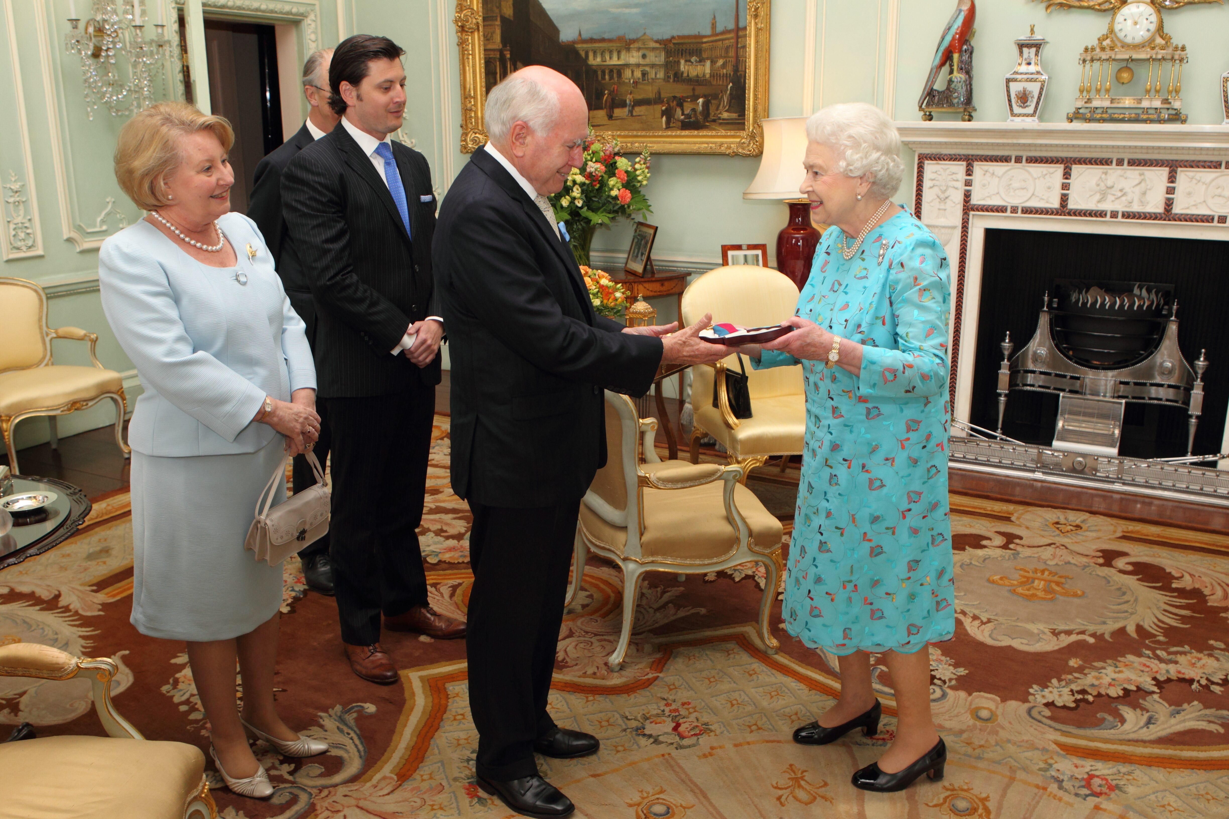Queen awards Howard Order of Merit - ABC News