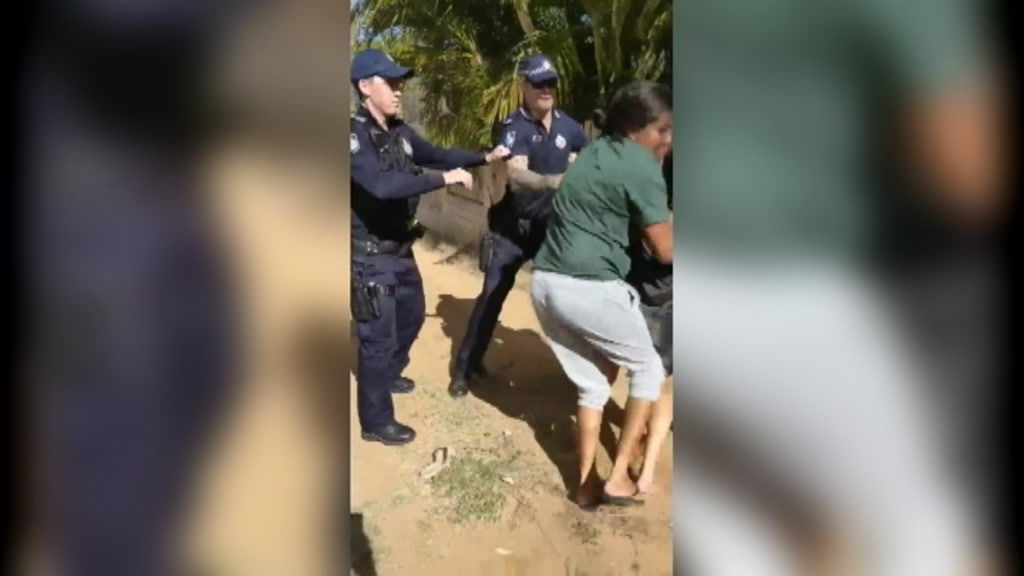 Footage shows police scuffle with young girl at Charters Towers - ABC News