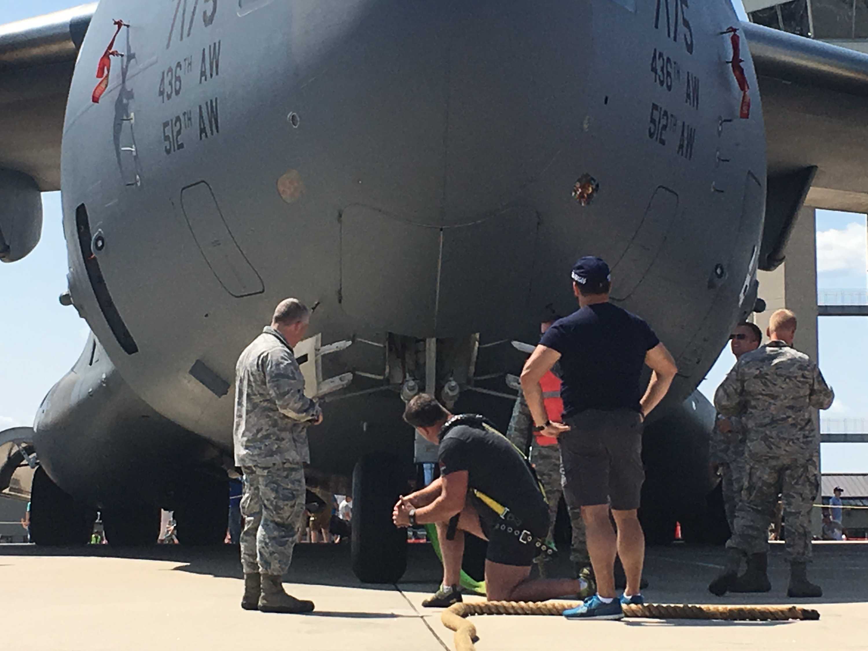 AFP commander and Australian strongman Grant Edwards pulls 190-tonne C ...