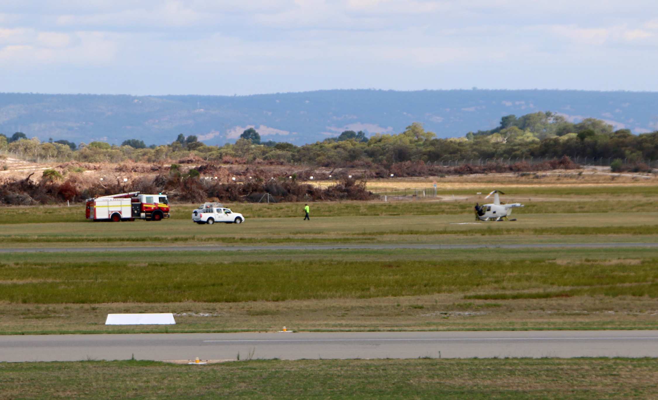 Helicopter crashes at Jandakot Airport in Perth, pilot and passenger ...