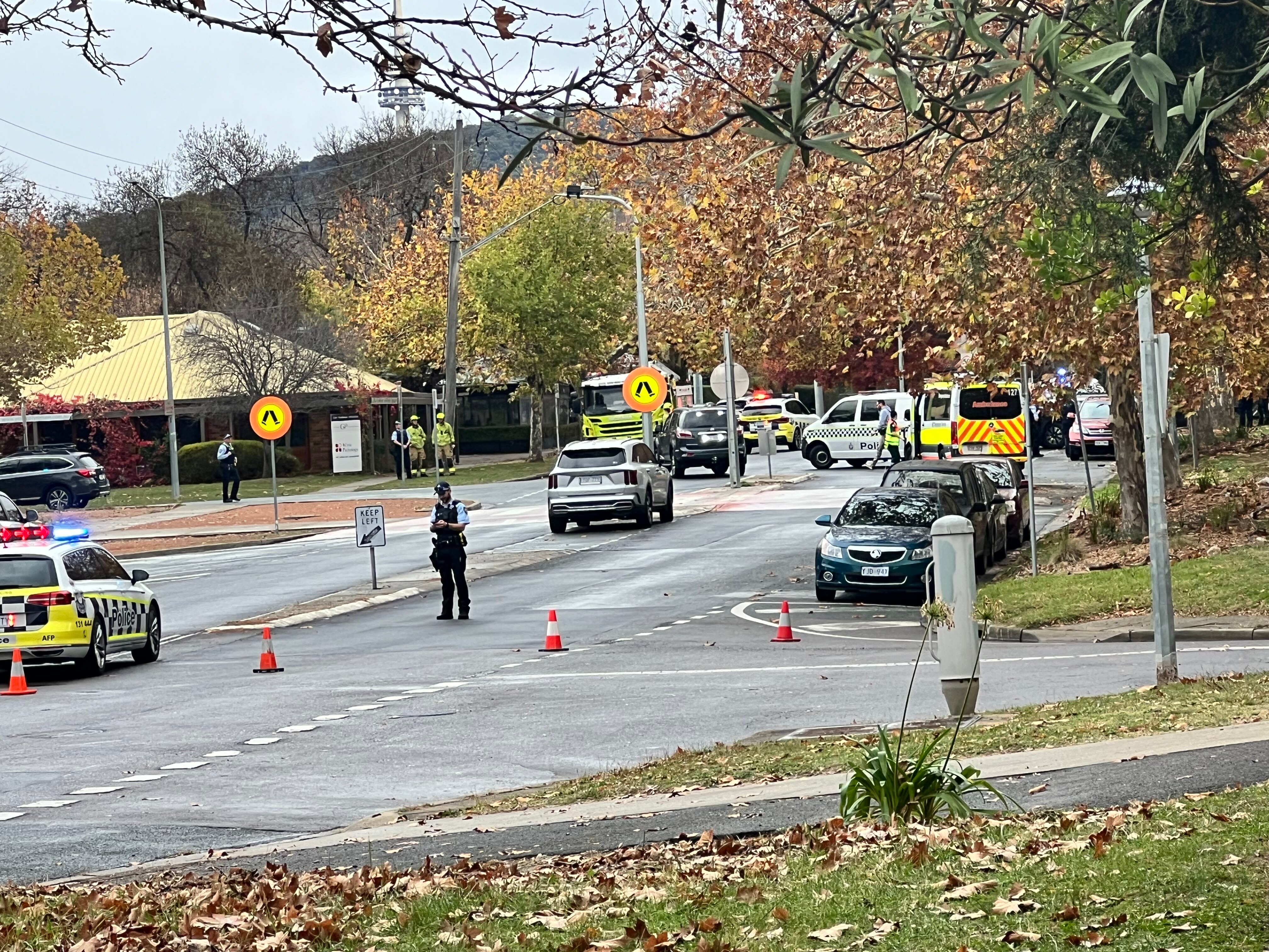 Man arrested after allegedly threatening two people with weapon ...