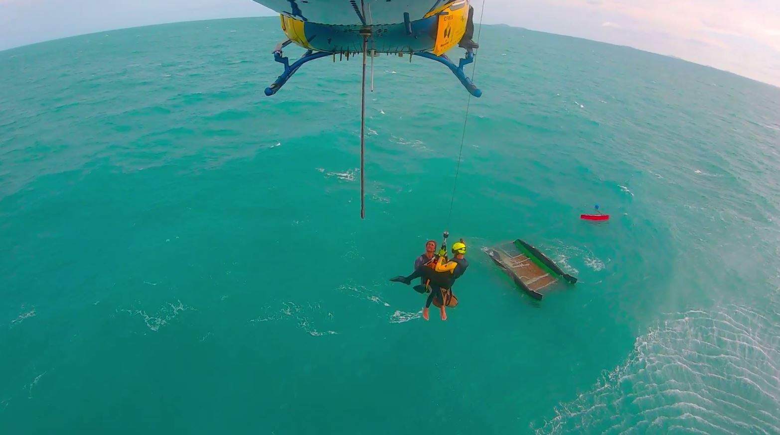 American tourist spends night on overturned catamaran after it capsizes ...