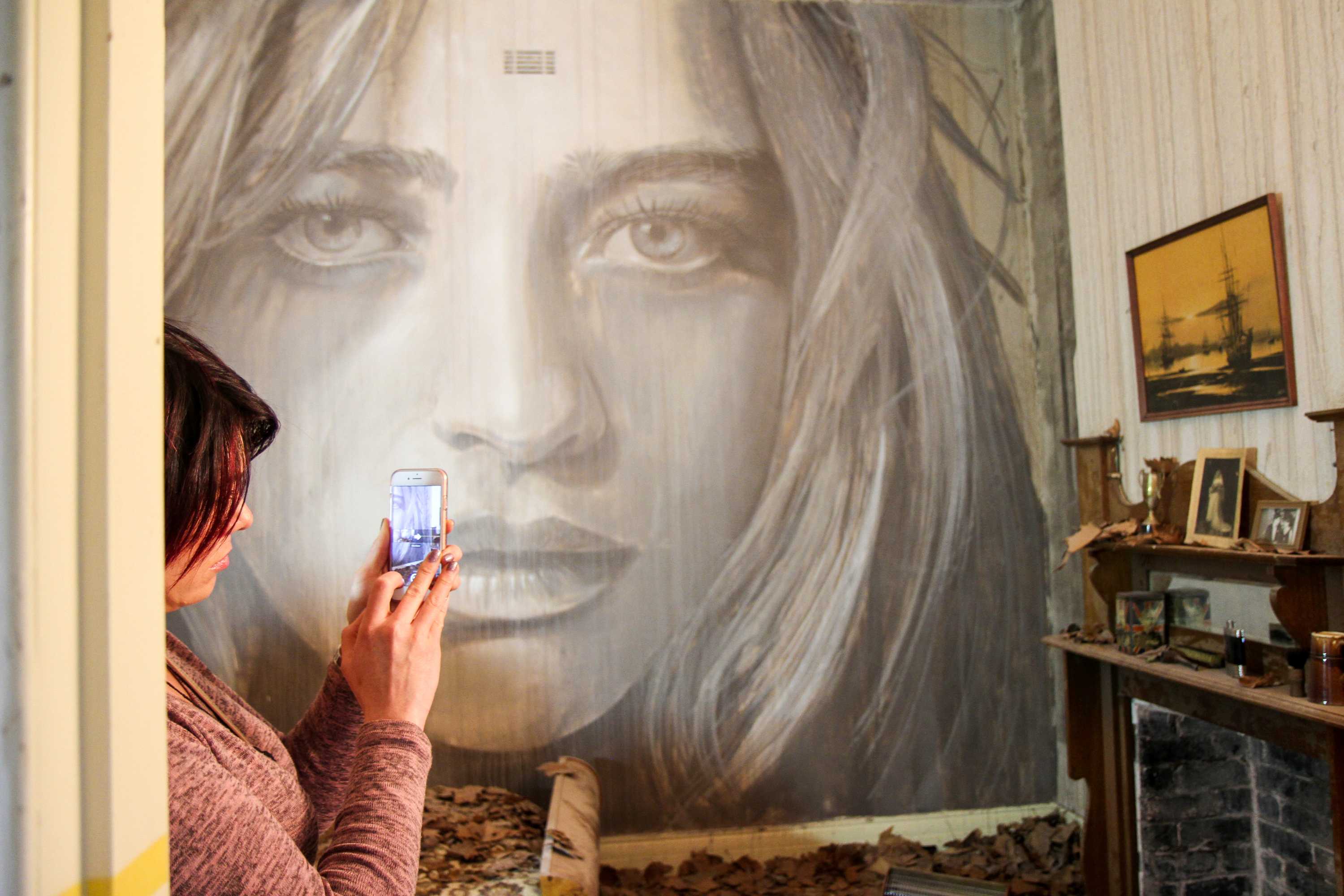 Street artist Rone transforms derelict Melbourne house for 'Omega ...