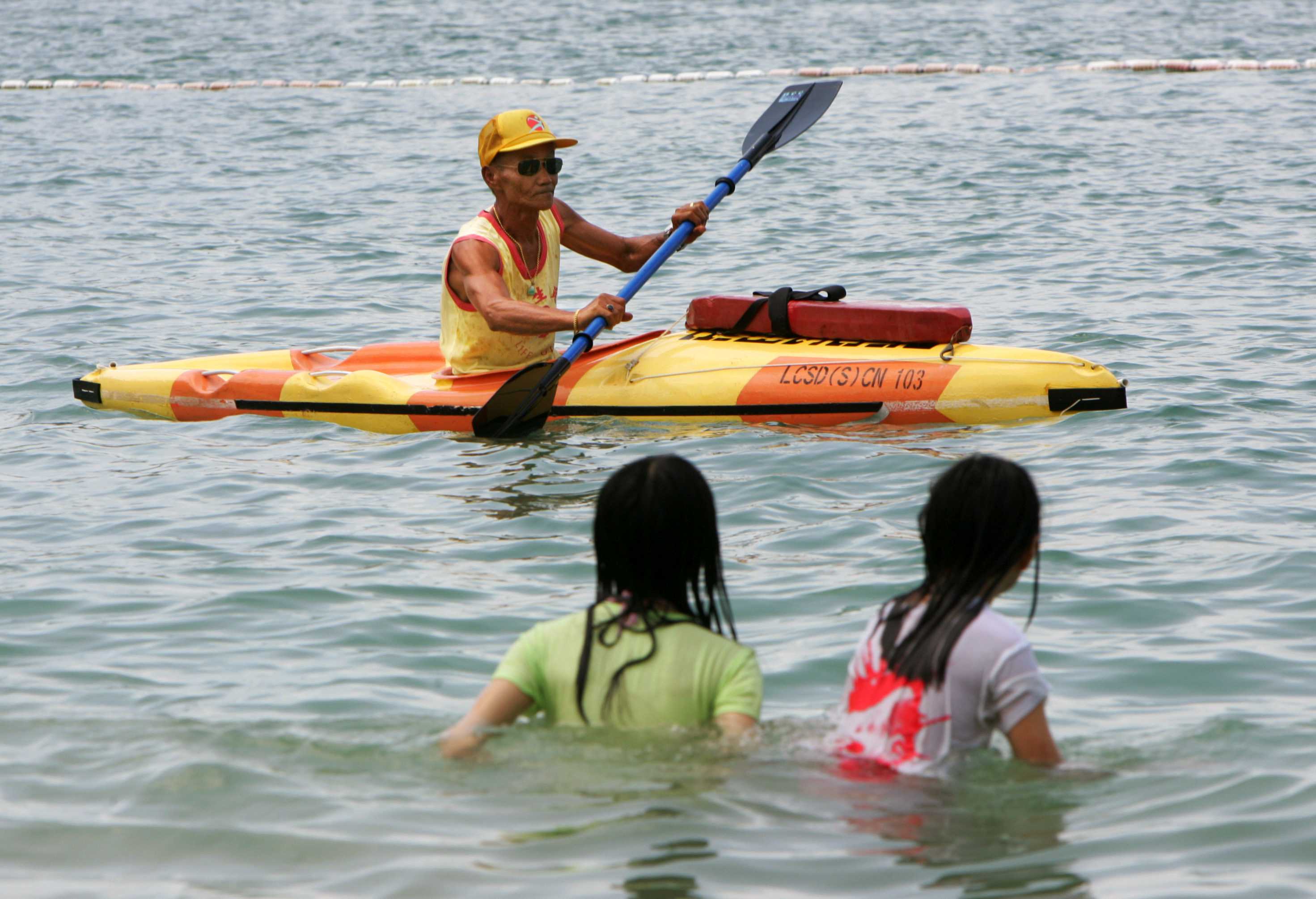 Hong Kong lifeguards strike over influx of swimmers from mainland China ...