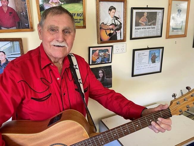 Tamworth Golden Guitar Award thrills bush balladeer Angus Gill, who ...