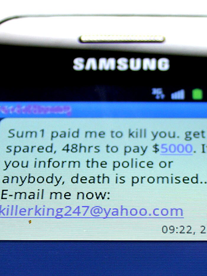 'Hitman' demands $5k in texting scam - ABC News