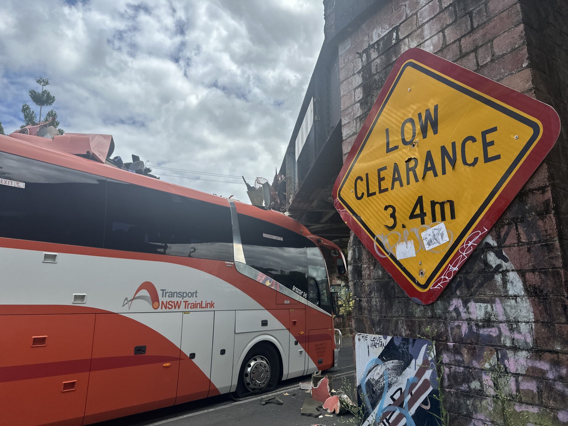 Rail bridge 'at risk of collapse' has become 'graveyard' for buses ...