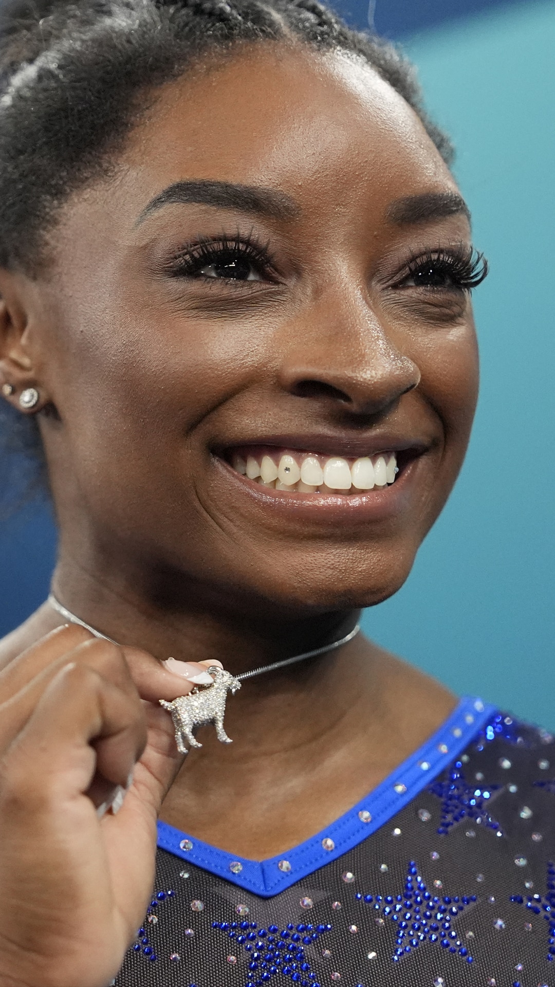 Why Simone Biles wears a goat necklace - ABC News