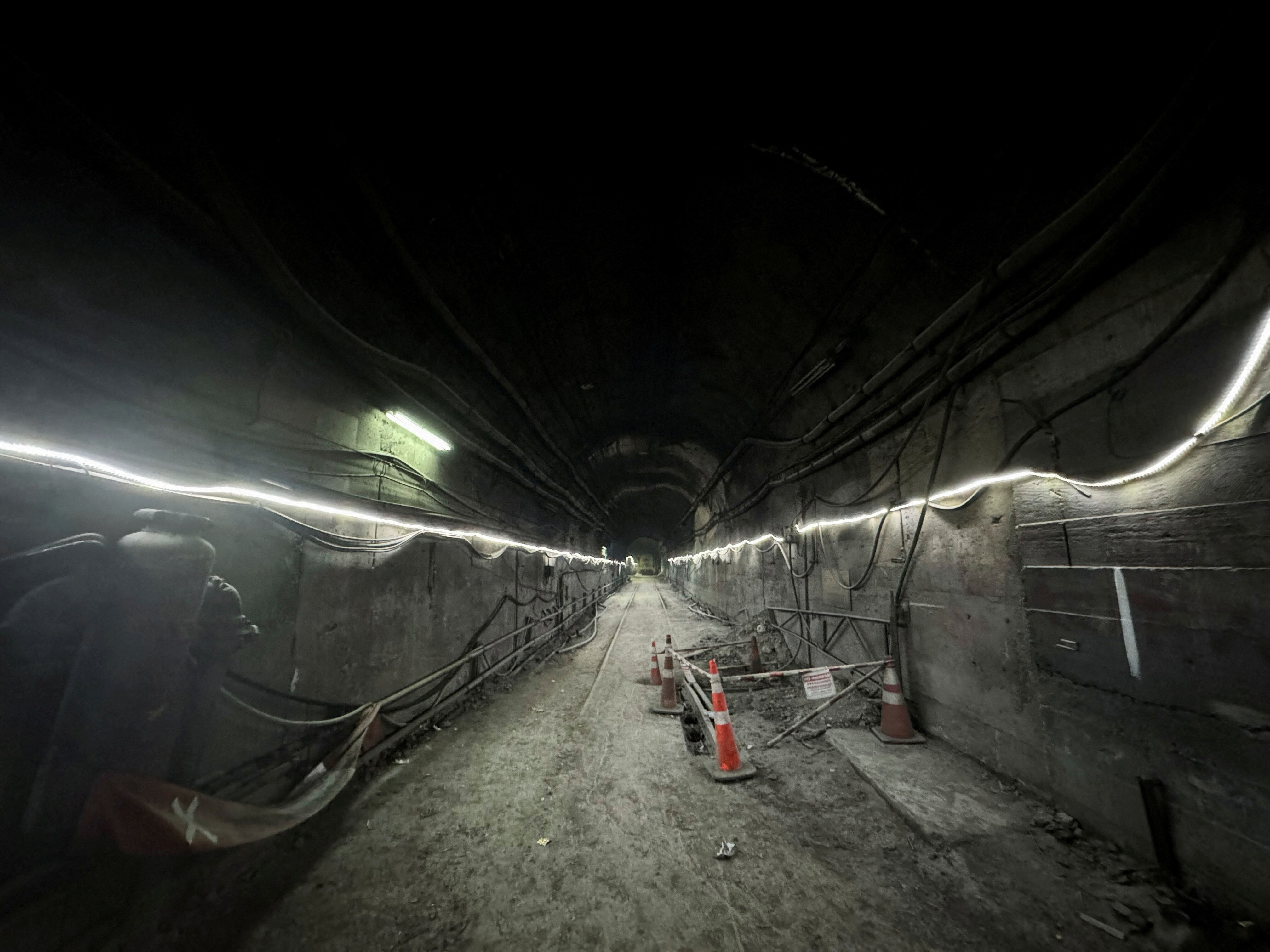 Teams race to rescue trapped workers at world's largest underground ...