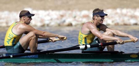 Tomkins, Ginn race into final - ABC News