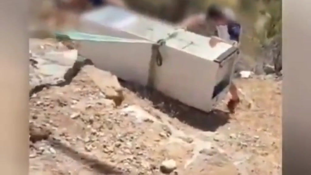 Men who mocked recycling by throwing fridge down ravine ordered to haul ...