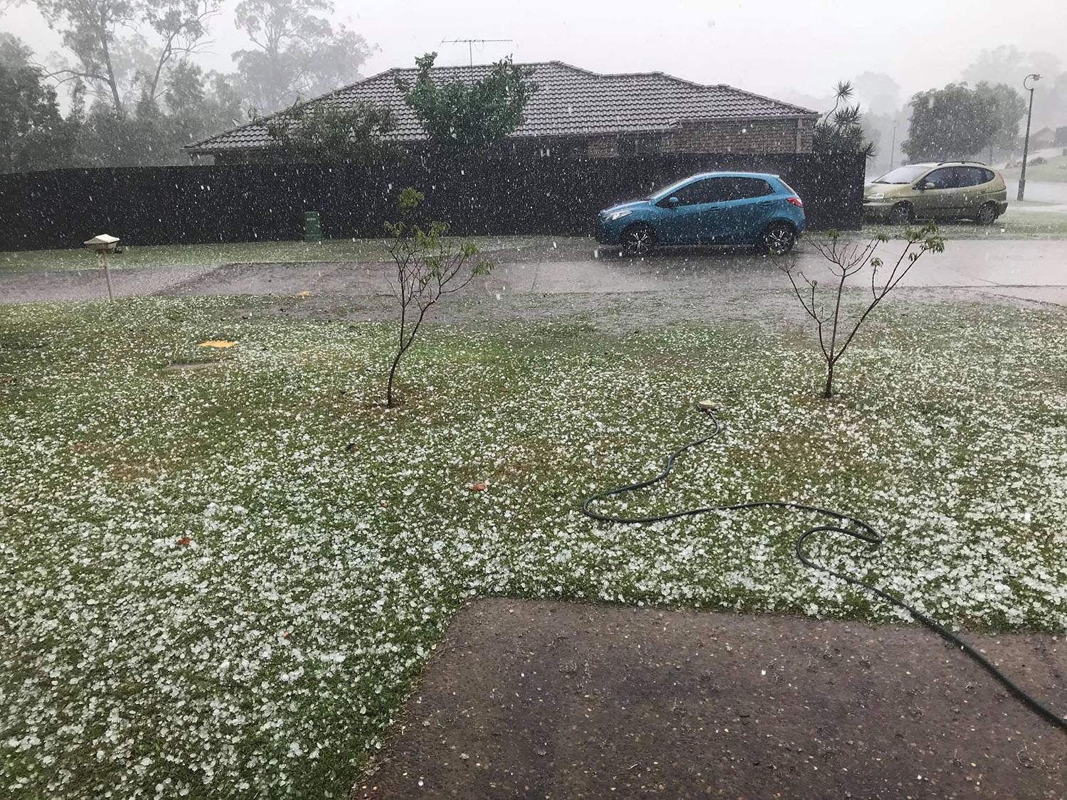 Hail, wild winds sweep south-east Queensland, some Bundaberg homes ...