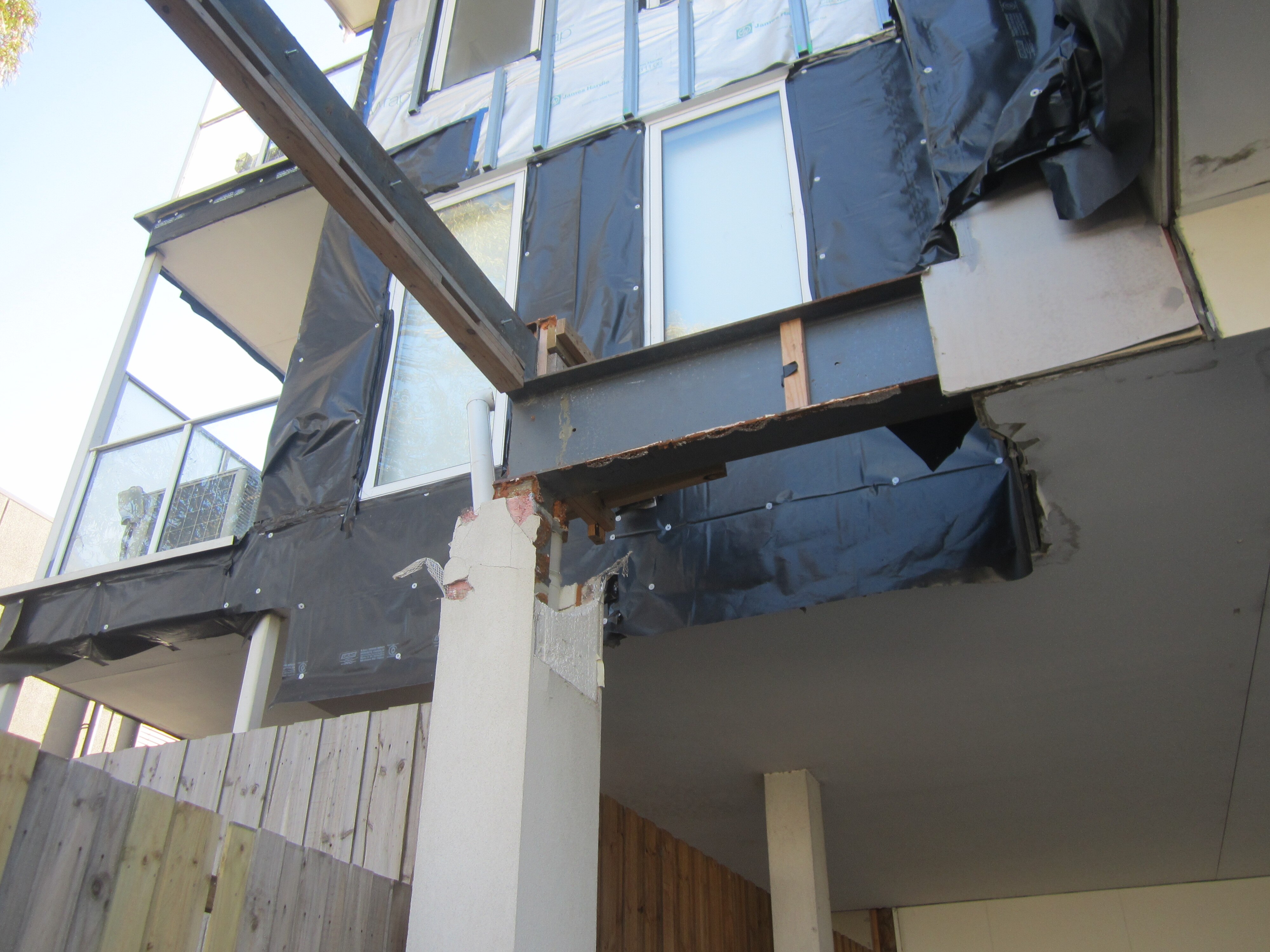 Defect-riddled apartments covered in mould could be write-offs as ...