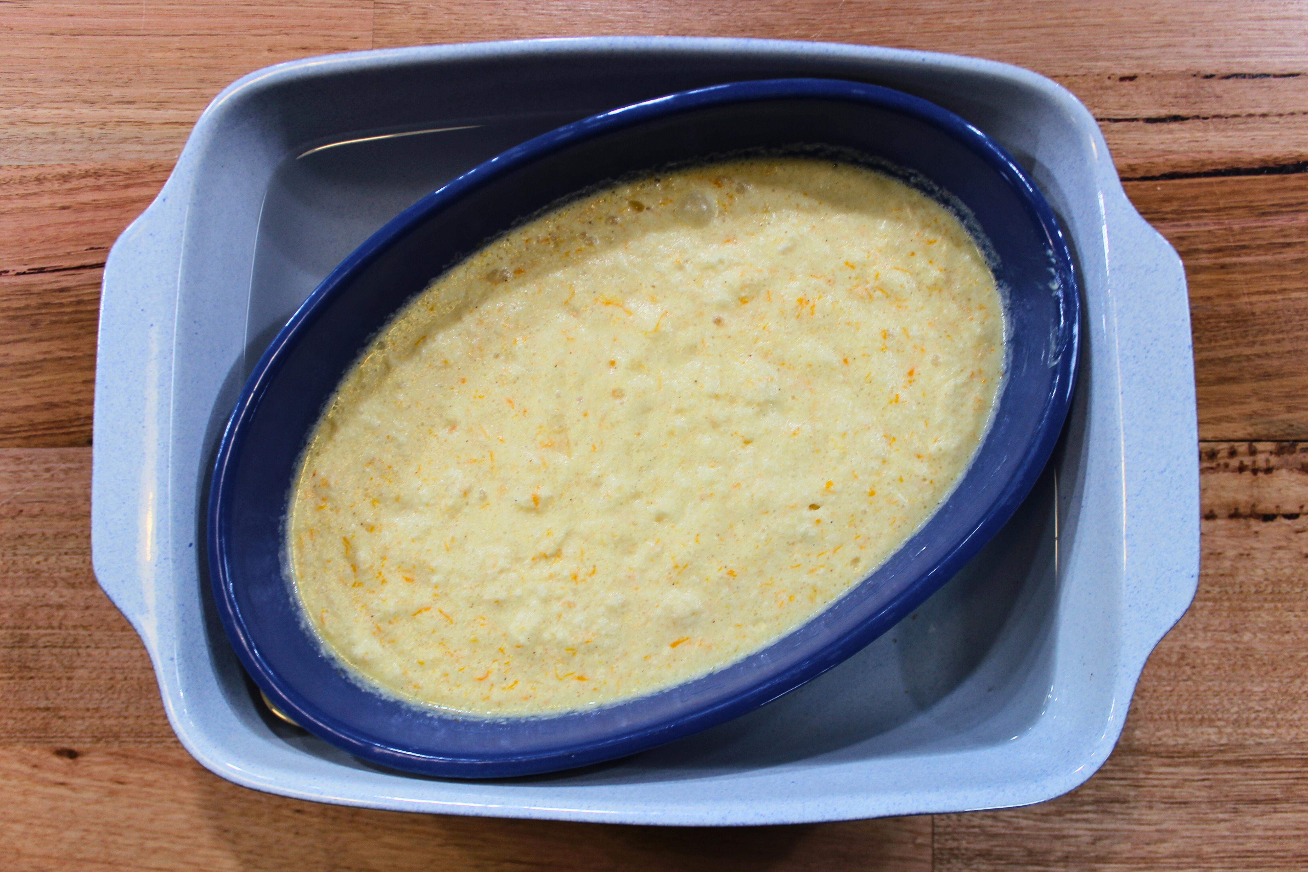 Orange delicious pudding with a self-saucing custard base - ABC News