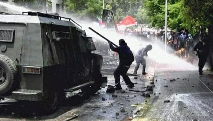 Police break up another day of protests in Chile - ABC News