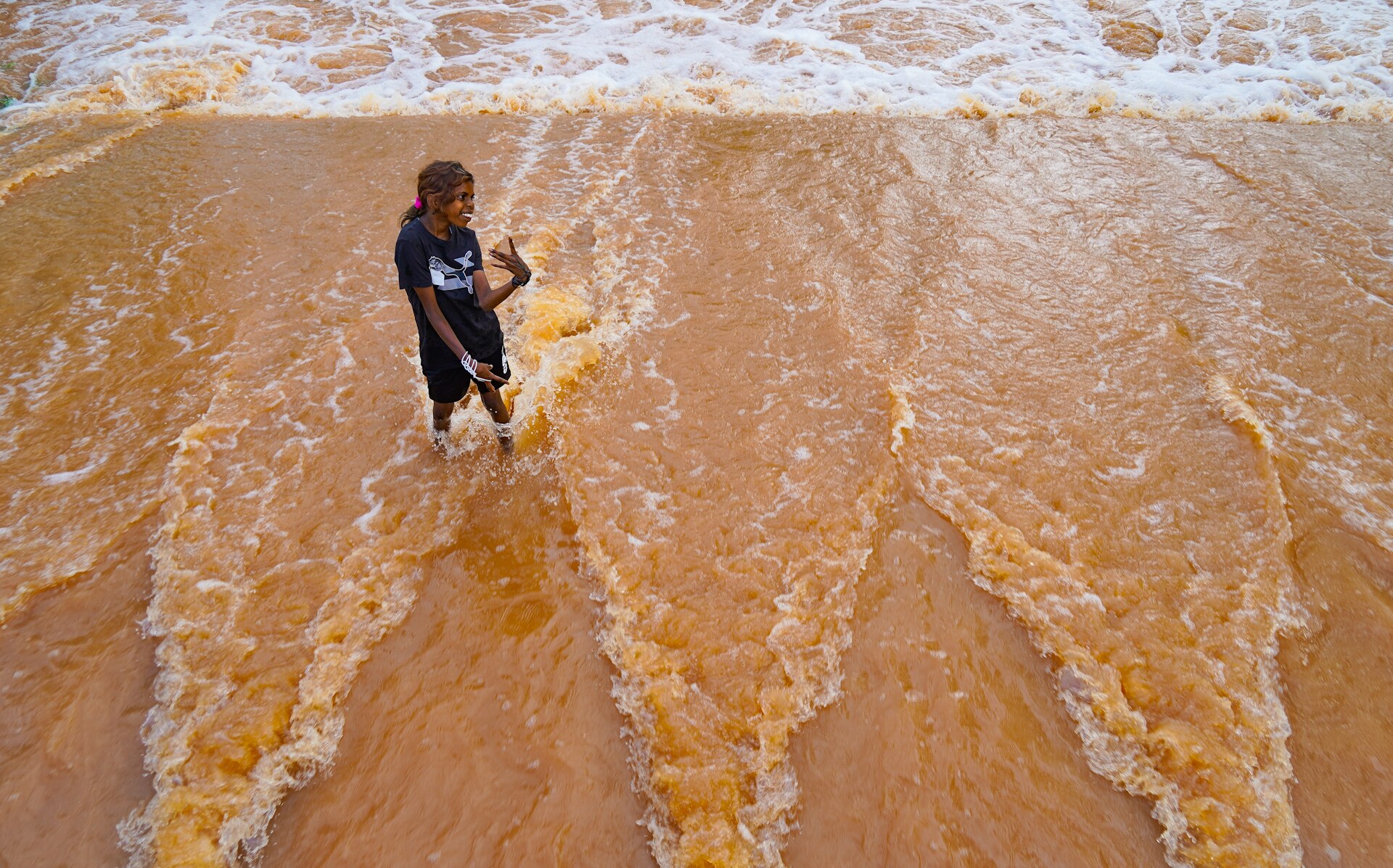 Alice Springs' usually dry Todd River flowing strong thanks to rain ...