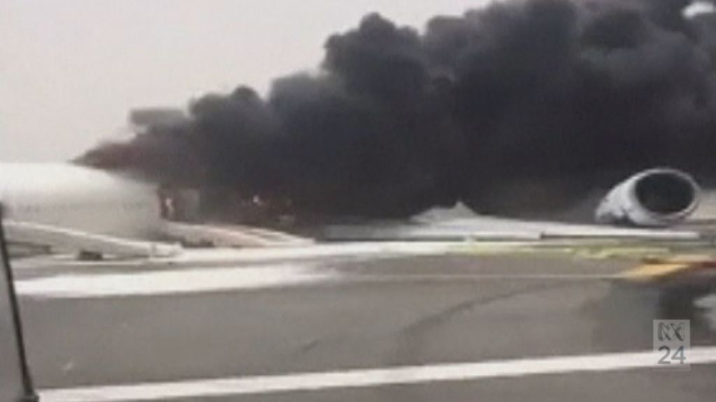 Emirates plane bursts into flames after crash-landing at Dubai airport ...