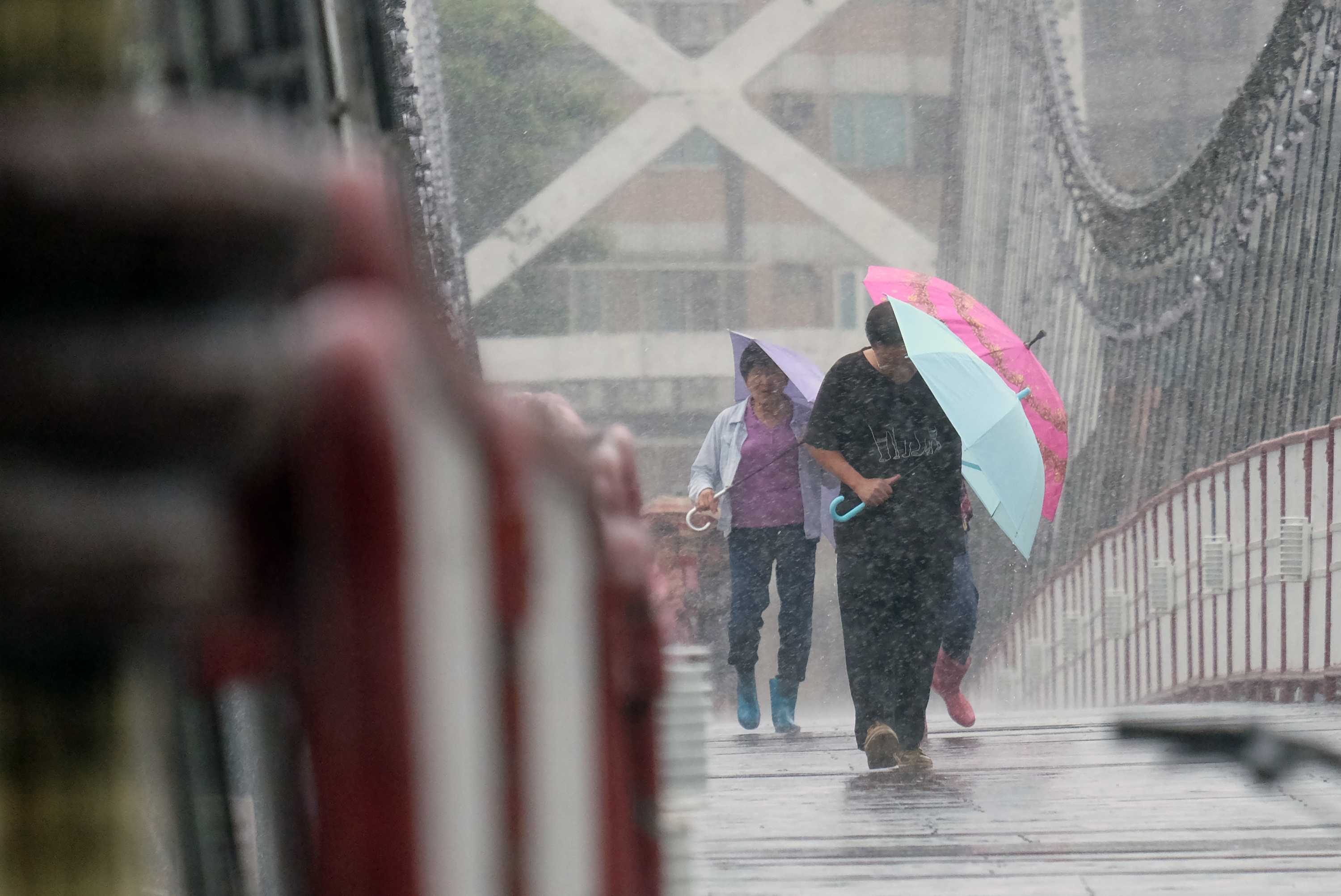 Taiwan's third typhoon of the month kills at least four, injures ...