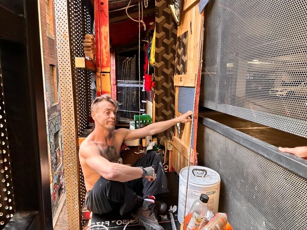 Artist protests against Melbourne's housing crisis in makeshift home ...