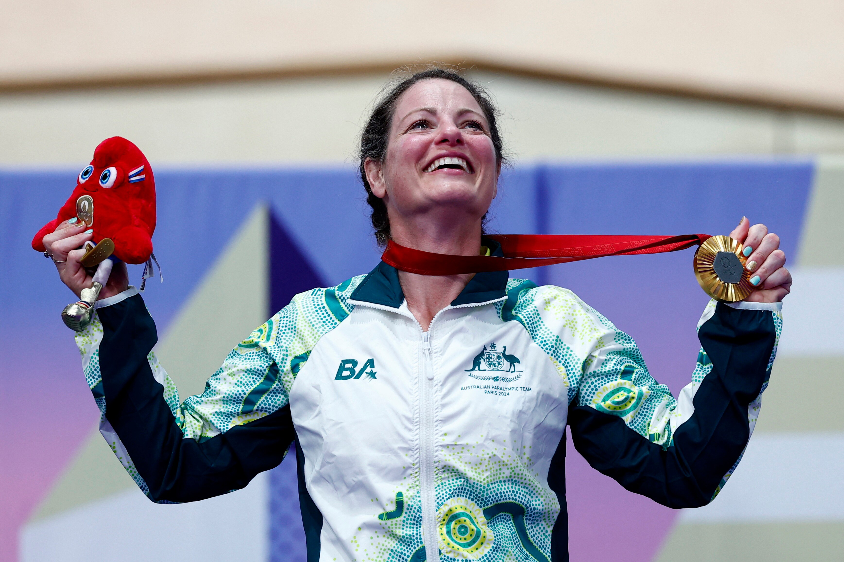 Emily Petricola overcomes MS flare-up and bike crash to defend crown at ...