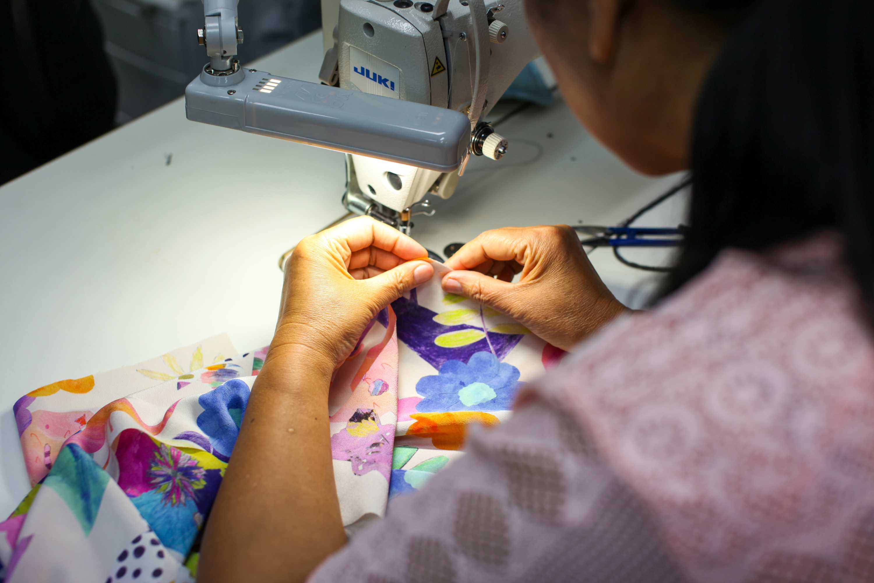 Silver lining for refugees at Sydney's Social Outfit - ABC News