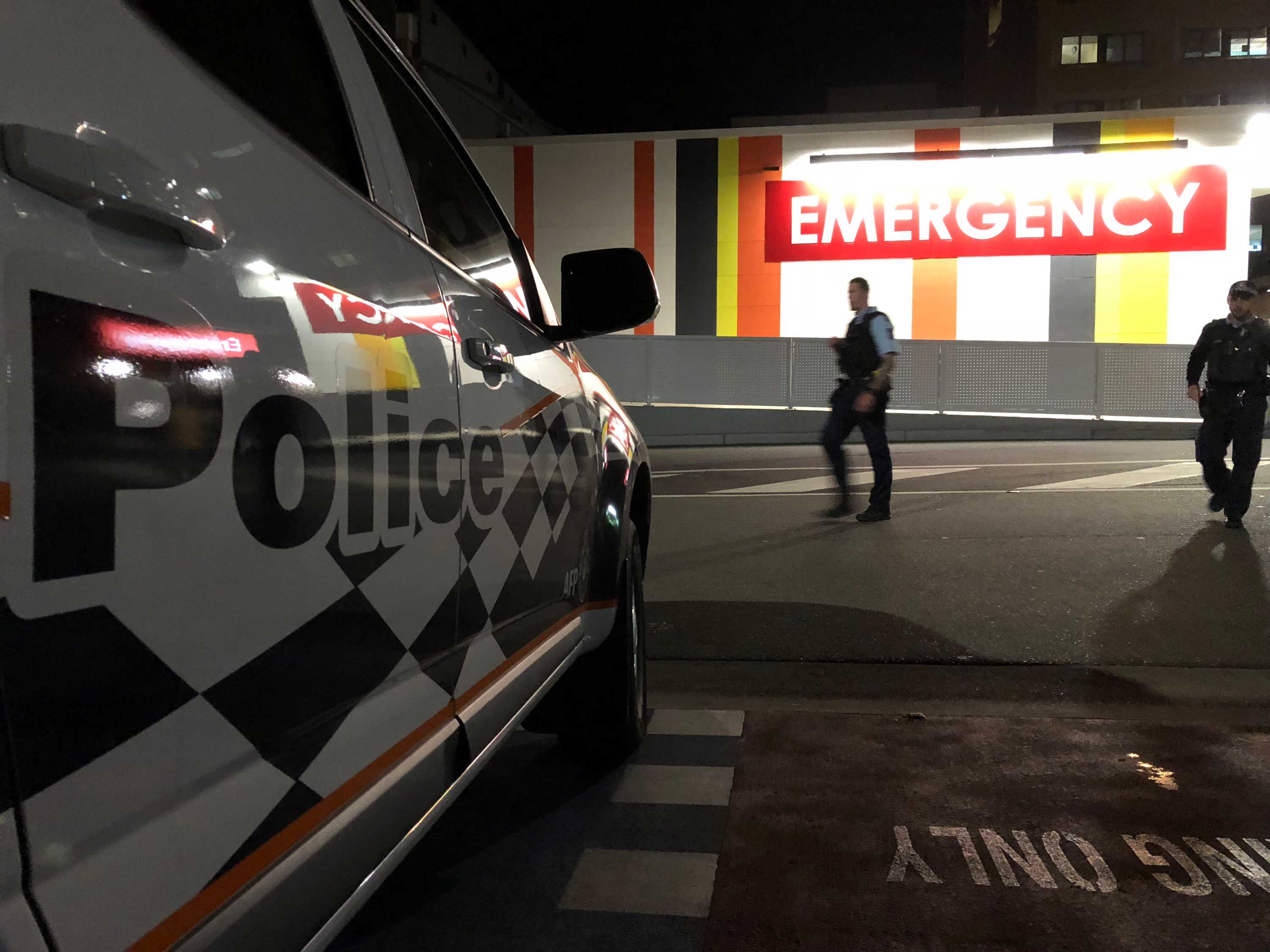Canberra Hospital patient steals police officer's gun, fires shot at ...
